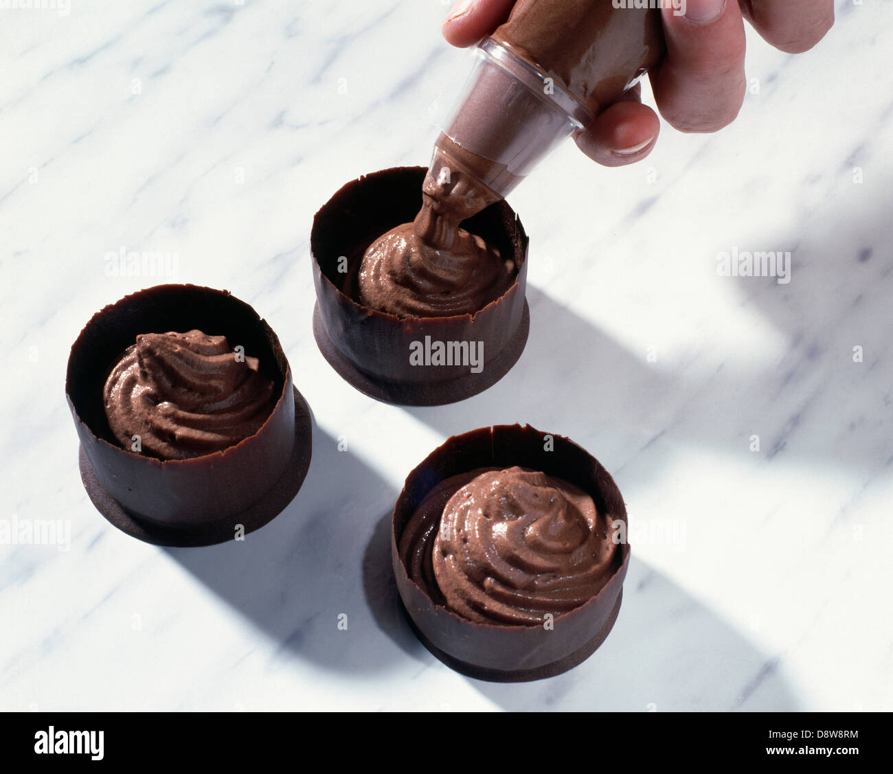 Piping chocolate hi-res stock photography and images - Alamy