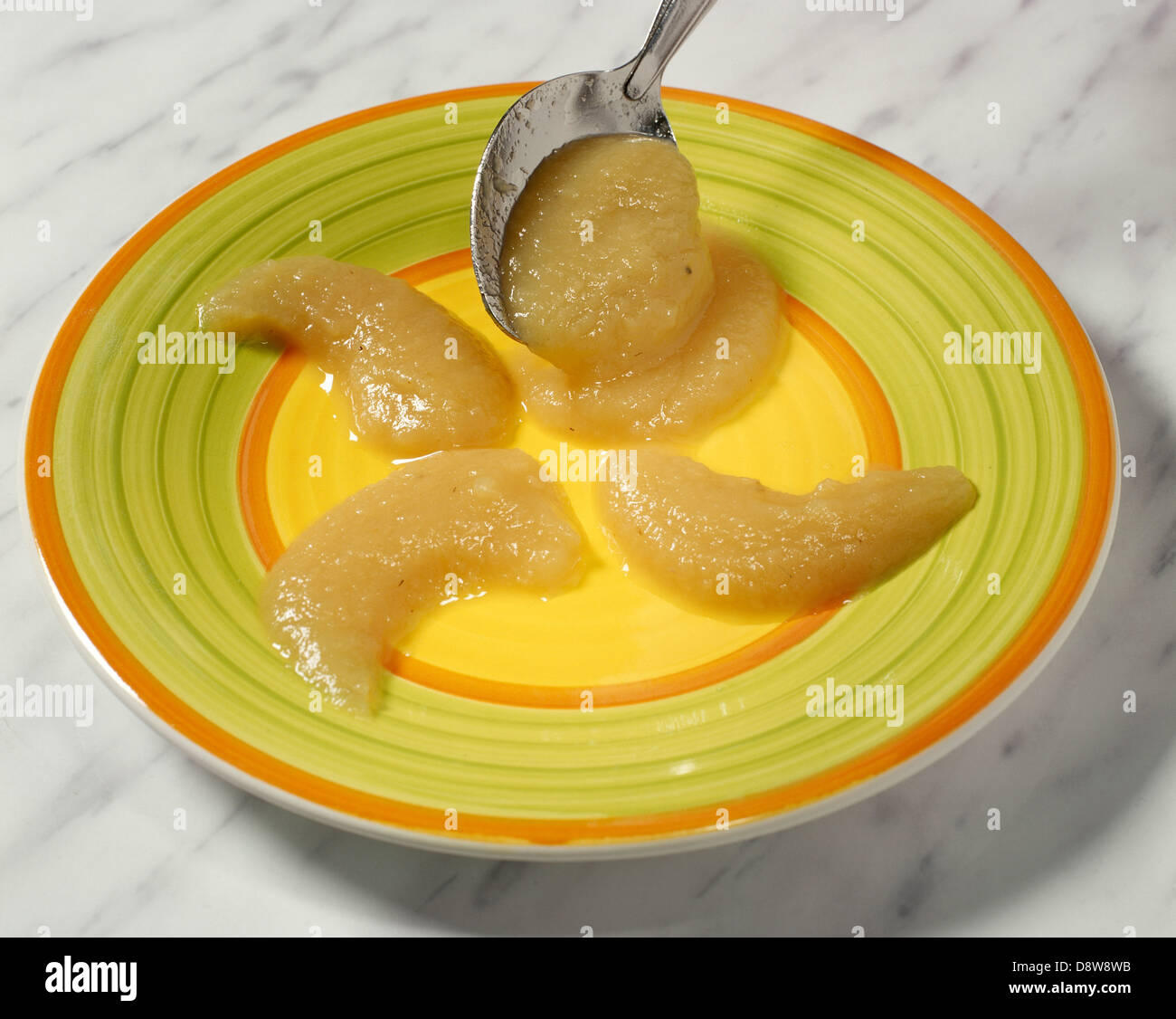 Placing the puree in petal shapes on the plate Stock Photo - Alamy