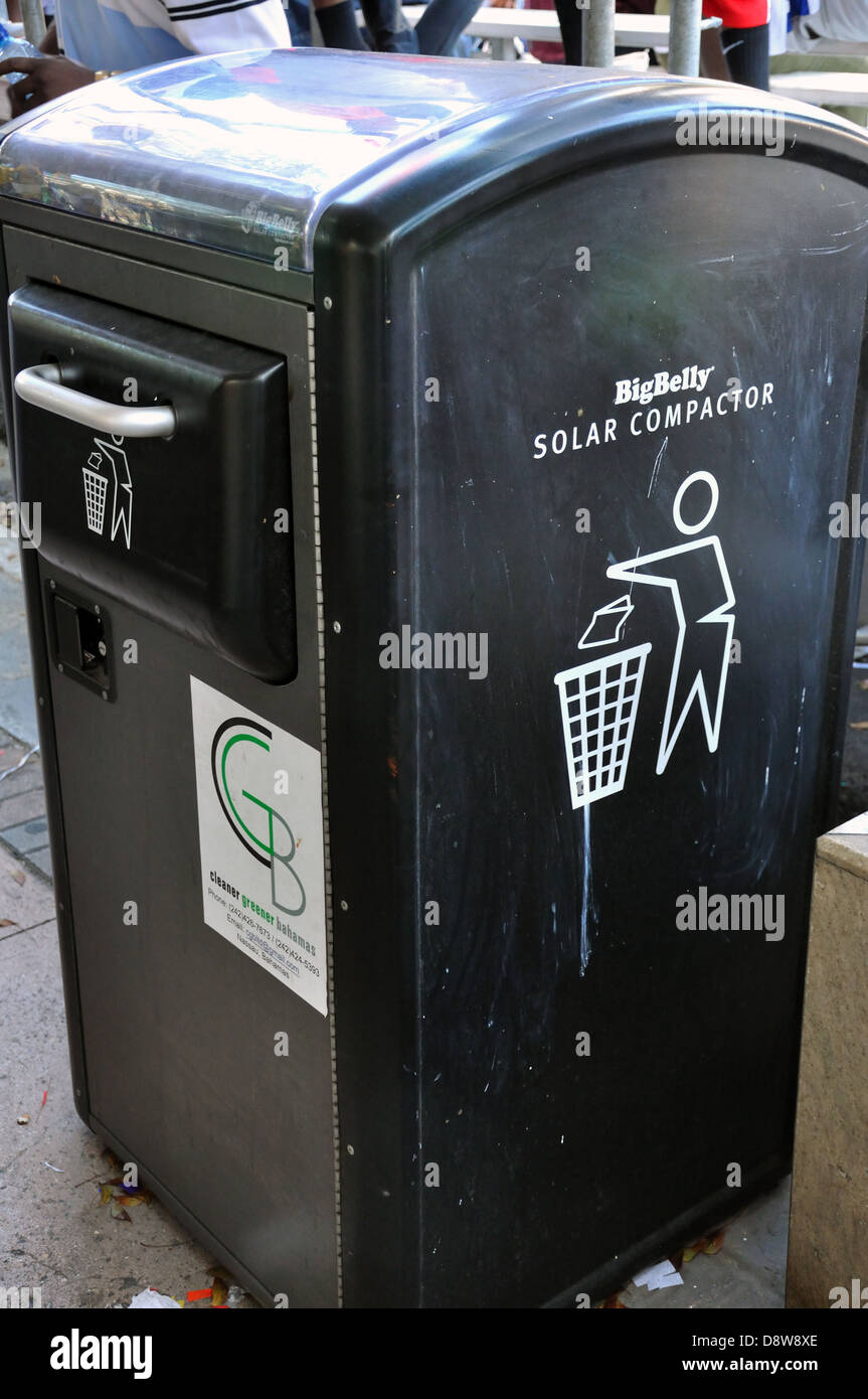 Solar compactor trash bin in Nassau, Bahamas Stock Photo - Alamy