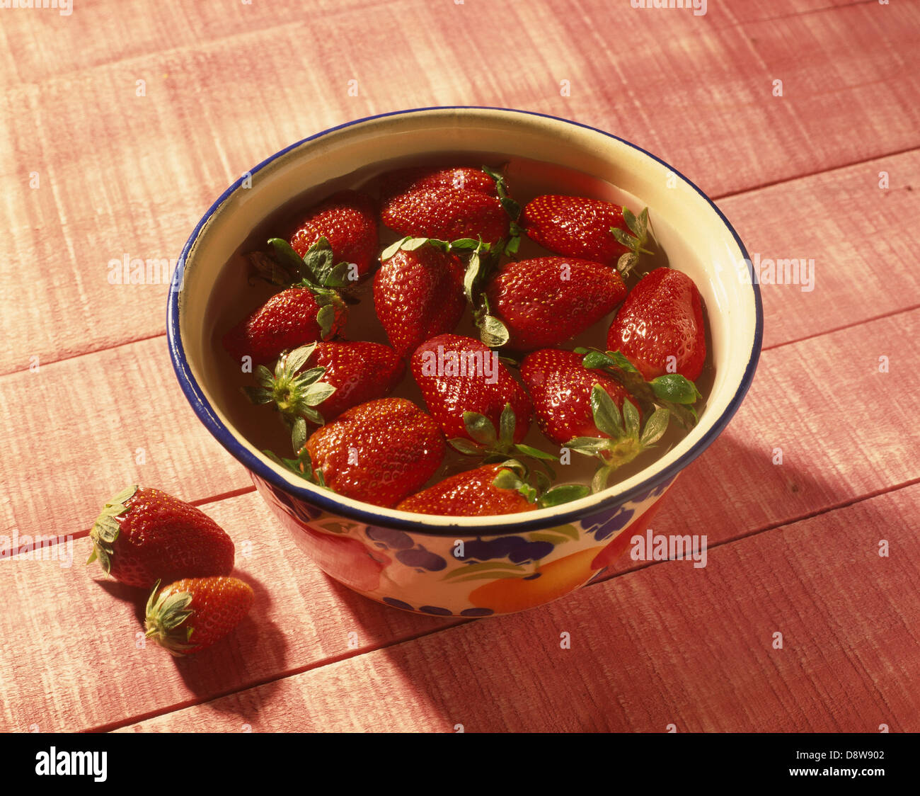 Washing the strawberries Stock Photo - Alamy