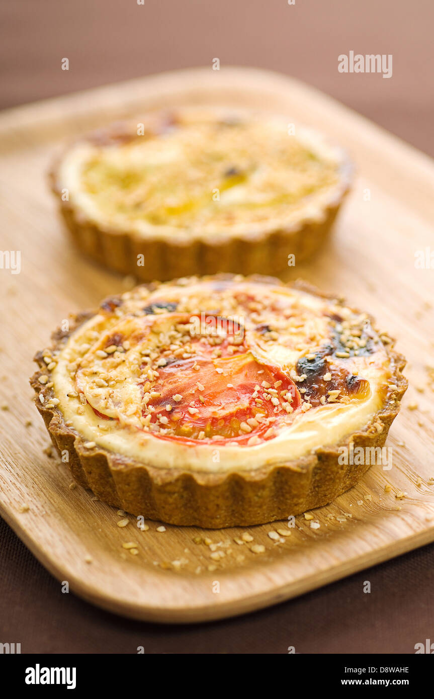 Tomato and grain savoury tartlets Stock Photo - Alamy