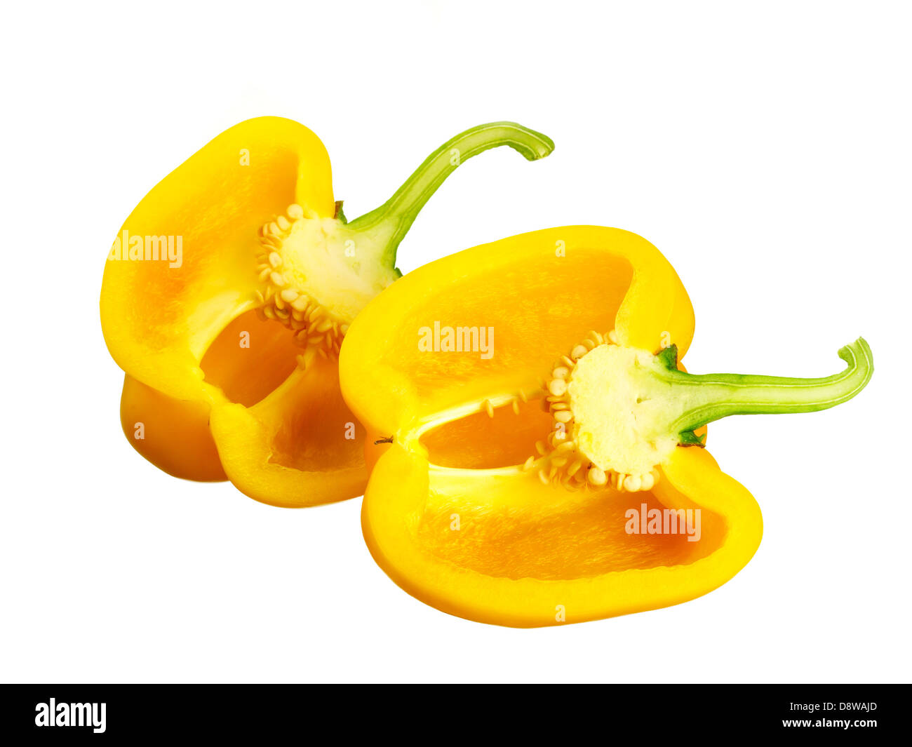 Cut out yellow pepper cut in half Stock Photo - Alamy