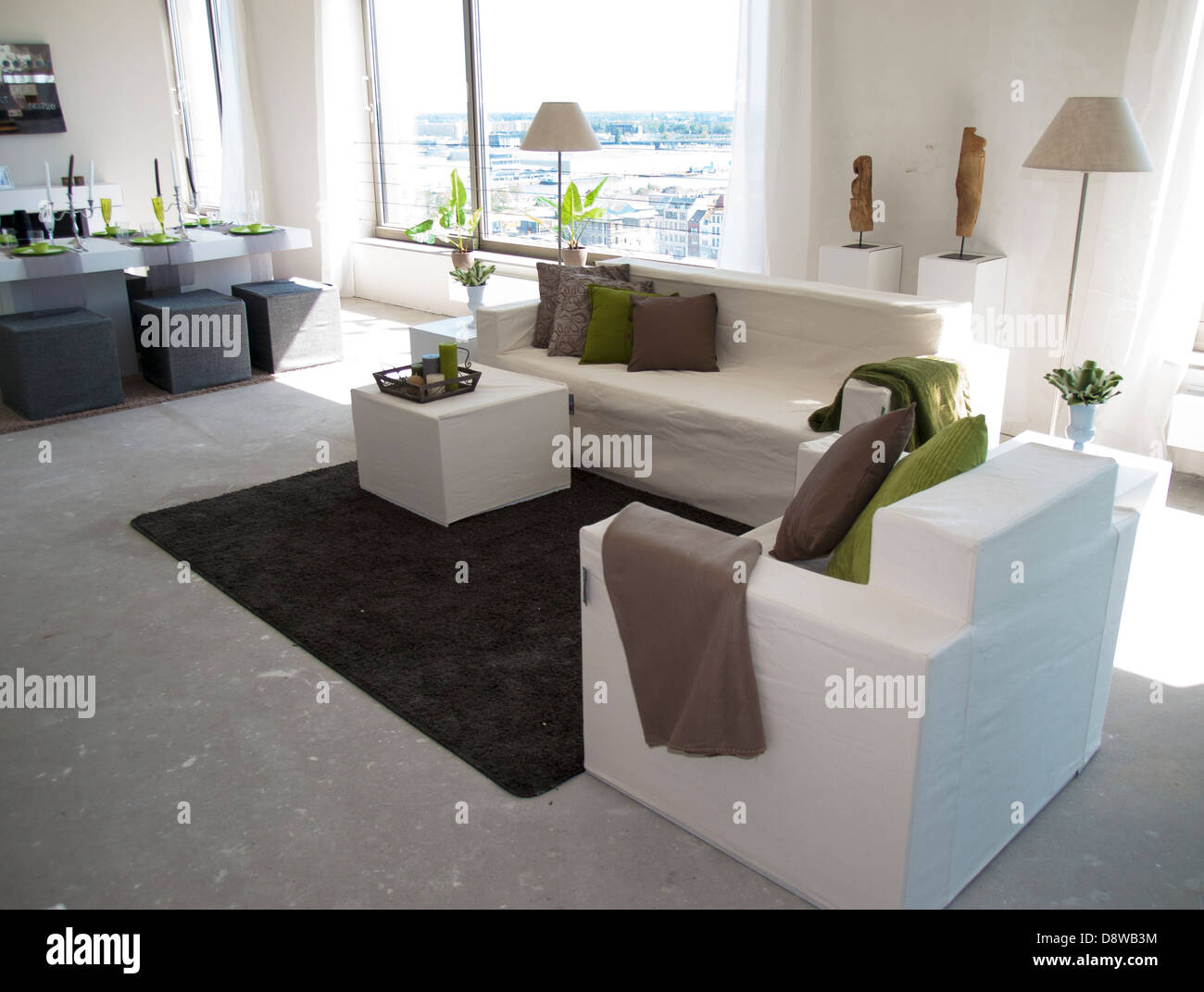 living room interior of a model home in a skyscraper Stock Photo - Alamy