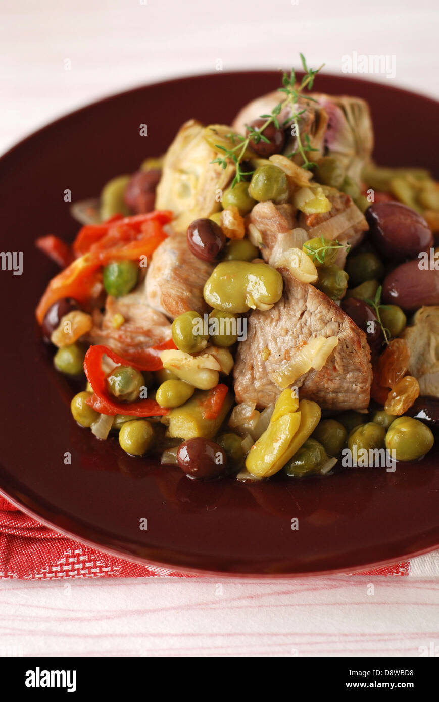Lamb sauté with spring vegetables Stock Photo - Alamy