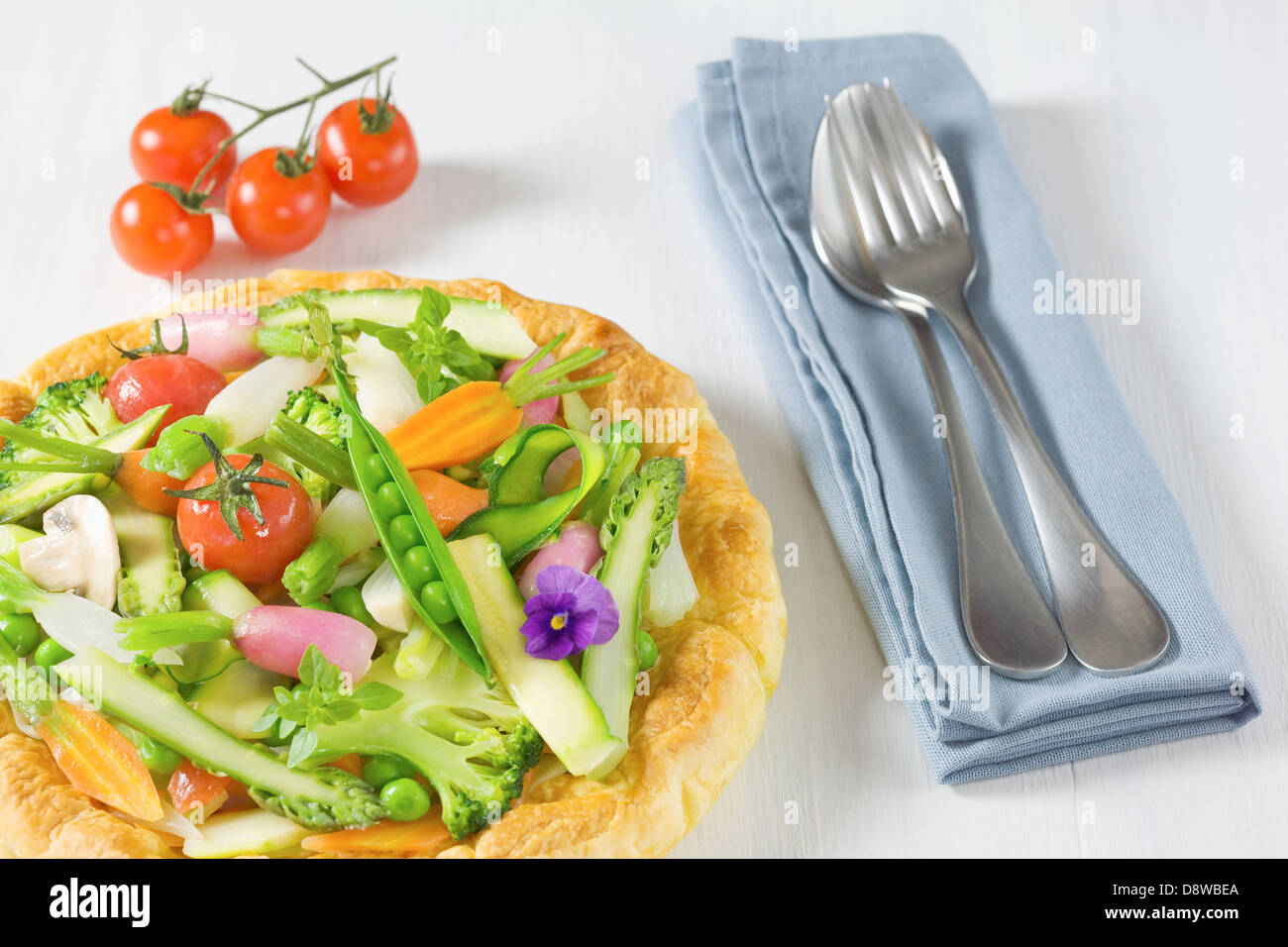 Spring garden vegetable flaky pastry tart Stock Photo - Alamy