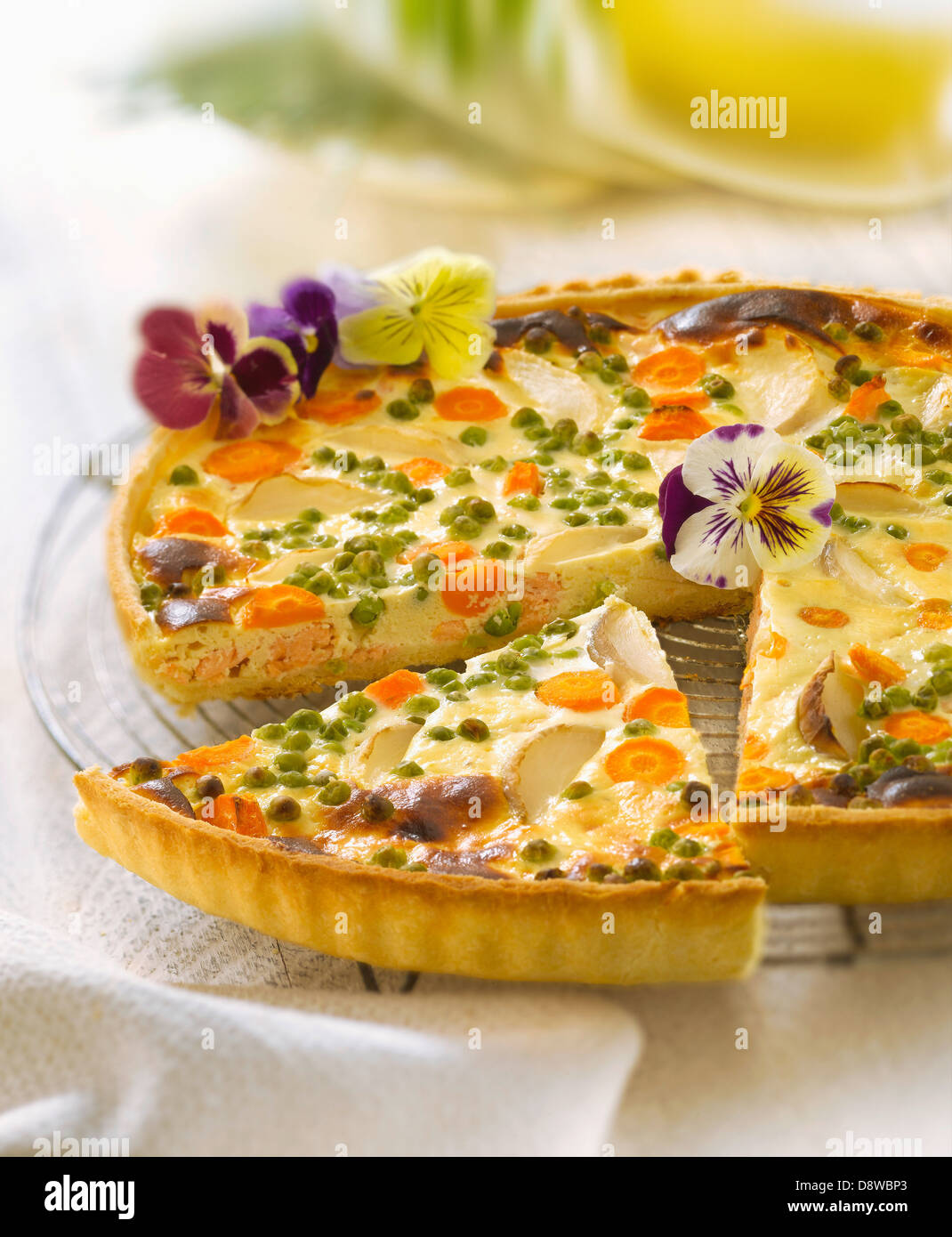 Salmon and spring vegetable savoury tart Stock Photo - Alamy
