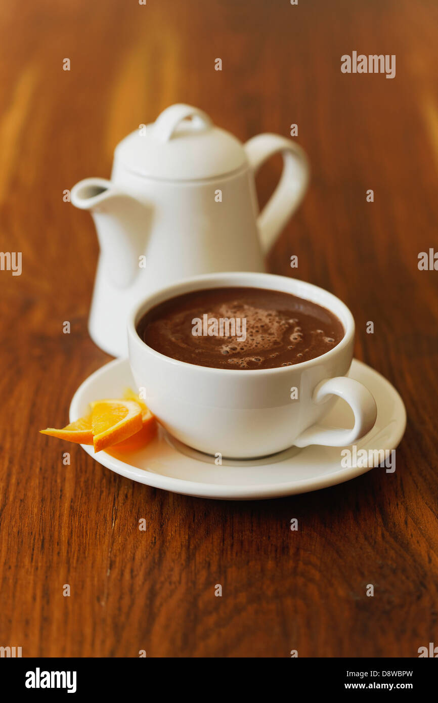 Cup of hot chocolate and chocolate pot Stock Photo - Alamy