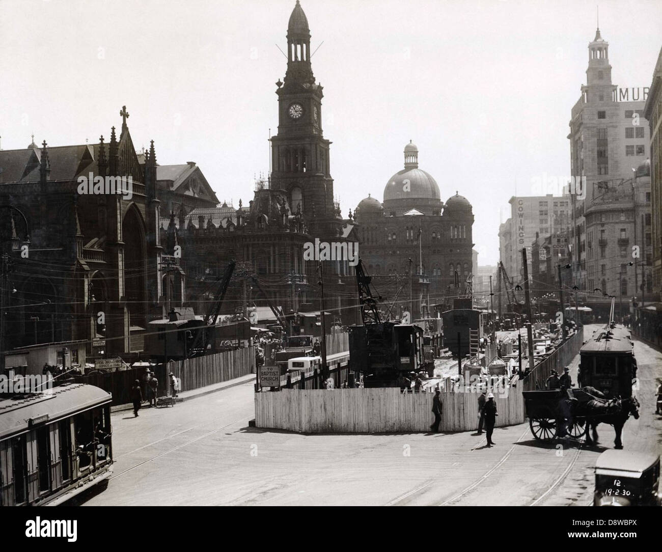 A historic image showing the construction of the Town Hall station in ...