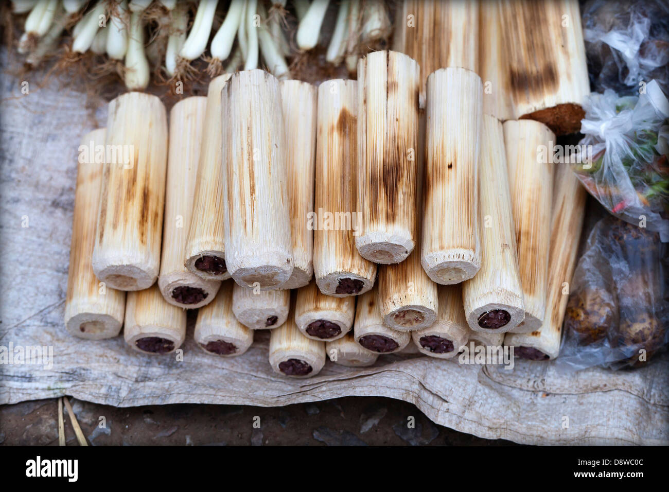 Bamboo shoots full of sticky rice in Luang Prabang, Laos Stock Photo ...