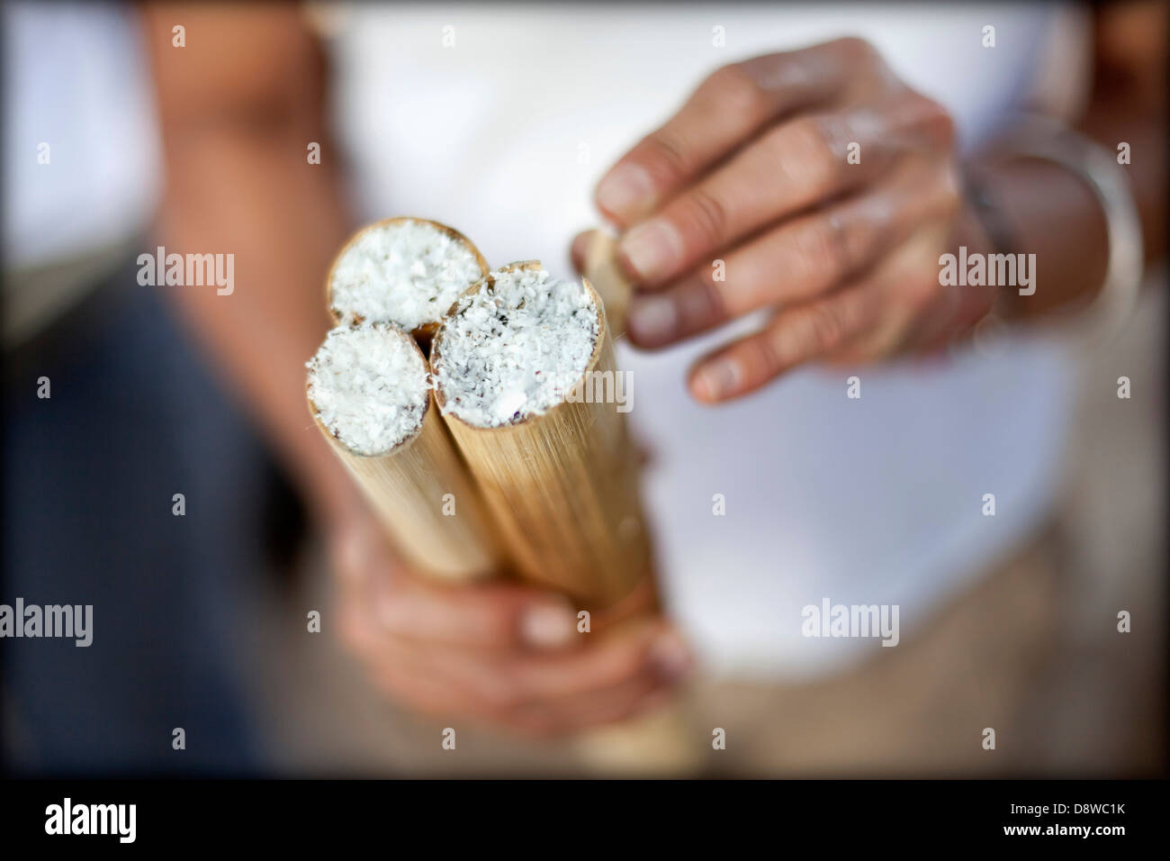Sticky rice in bamboo shoots in Paksé, Laos Stock Photo - Alamy