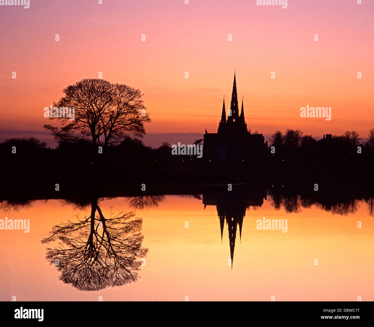 Stowe pool at sunset with the cathedral and it's reflection to rear ...
