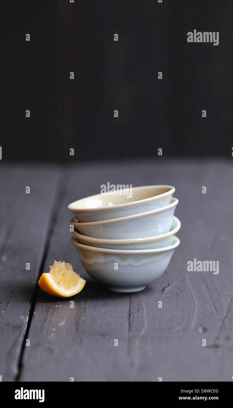 Chinese bowls and a slice of lemon Stock Photo - Alamy