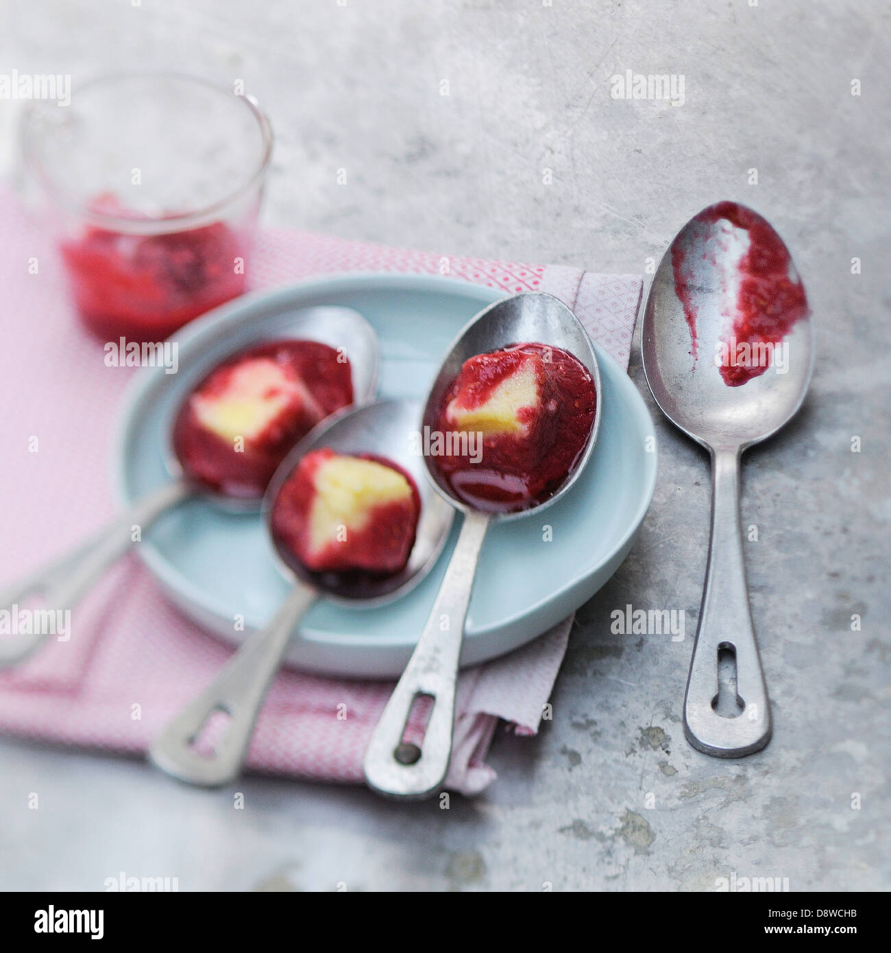 Spoonfuls of semolina pudding with raspberry jam Stock Photo - Alamy