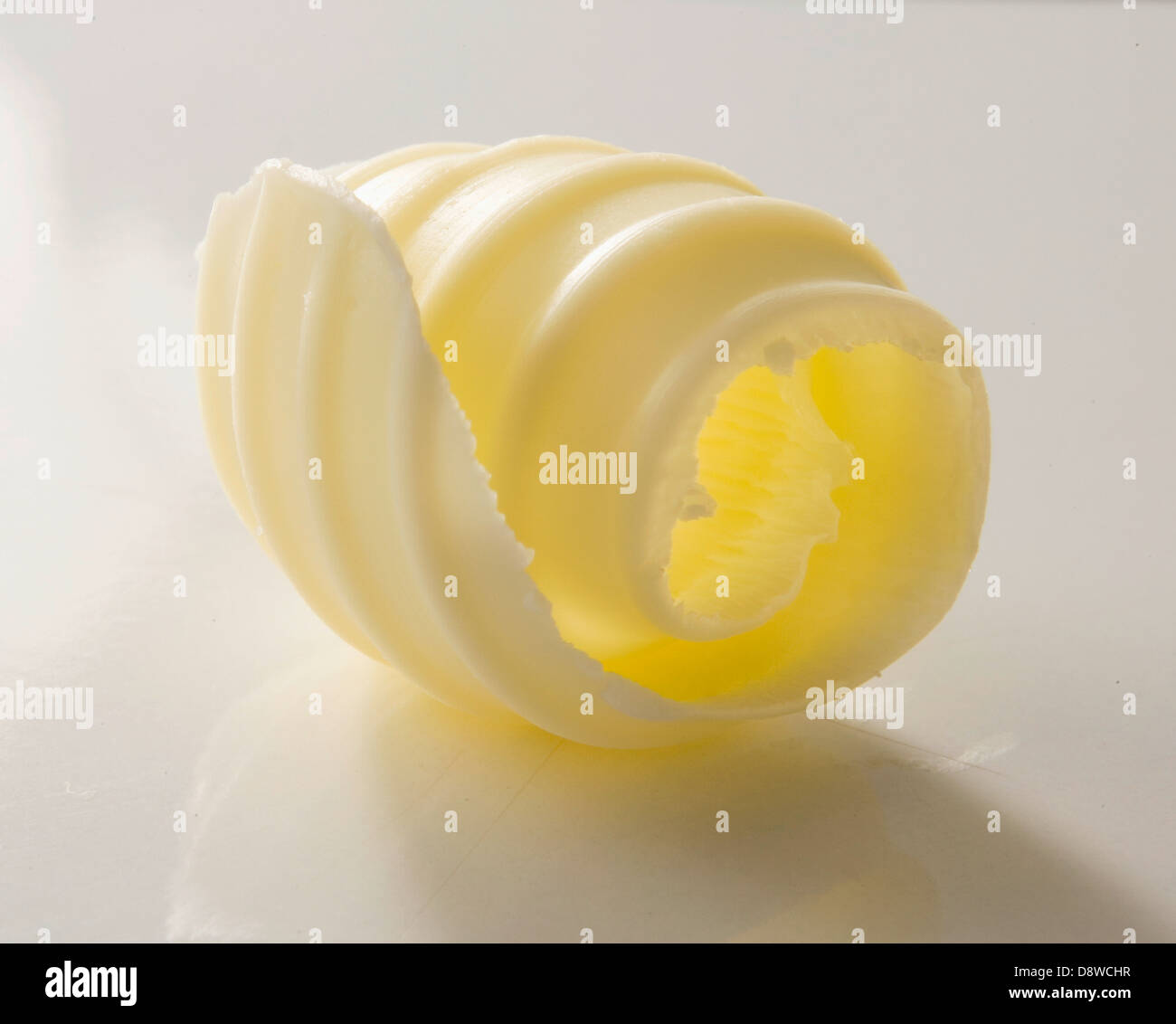 Curl of butter Stock Photo - Alamy