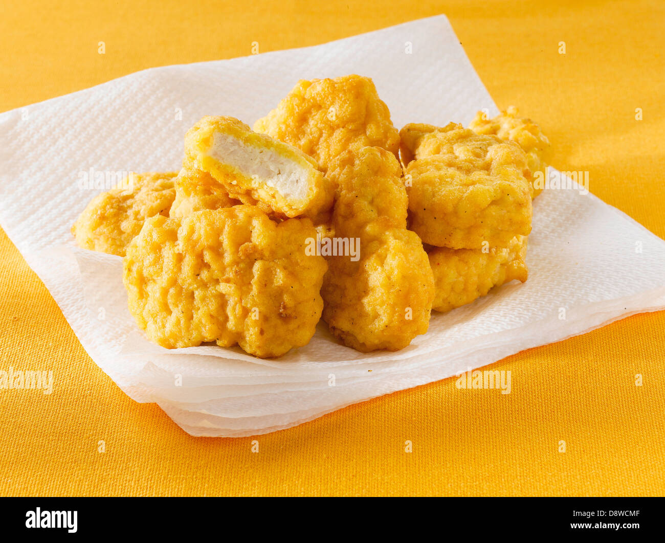 Chicken nuggets on absorbent paper Stock Photo - Alamy