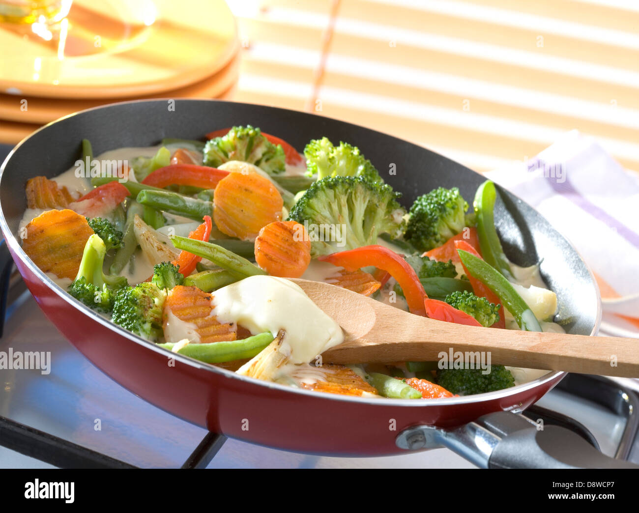 Pan-fried vegetables with light cream Stock Photo - Alamy