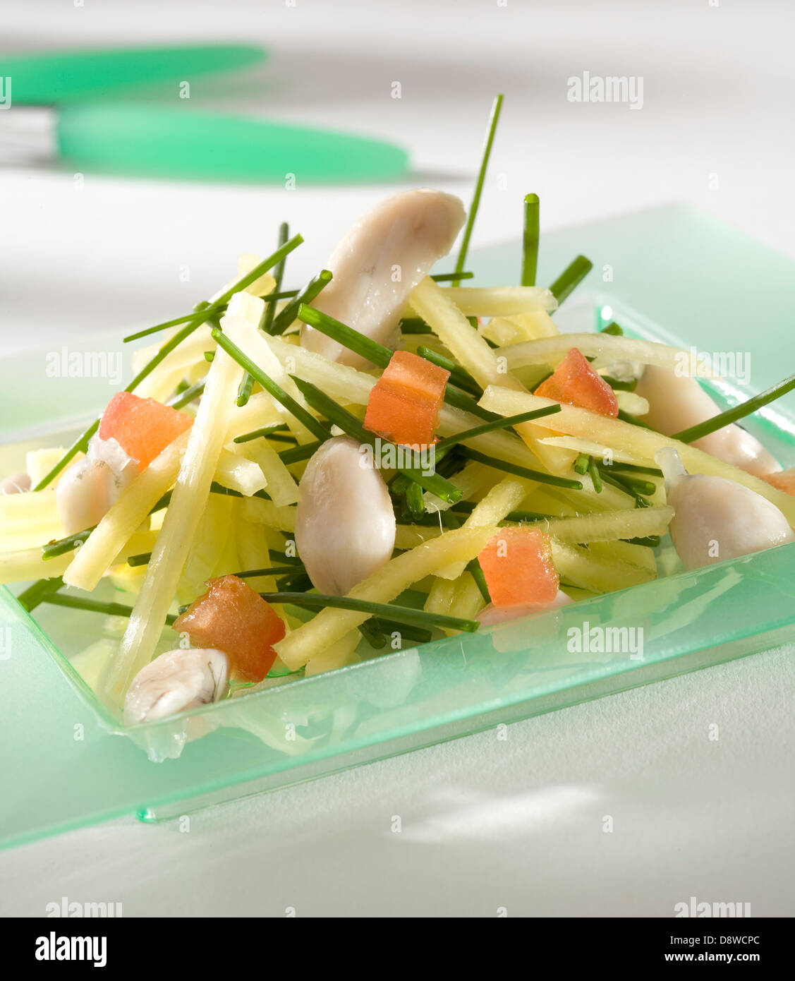 Crisp green papaya and frog's leg salad Stock Photo - Alamy