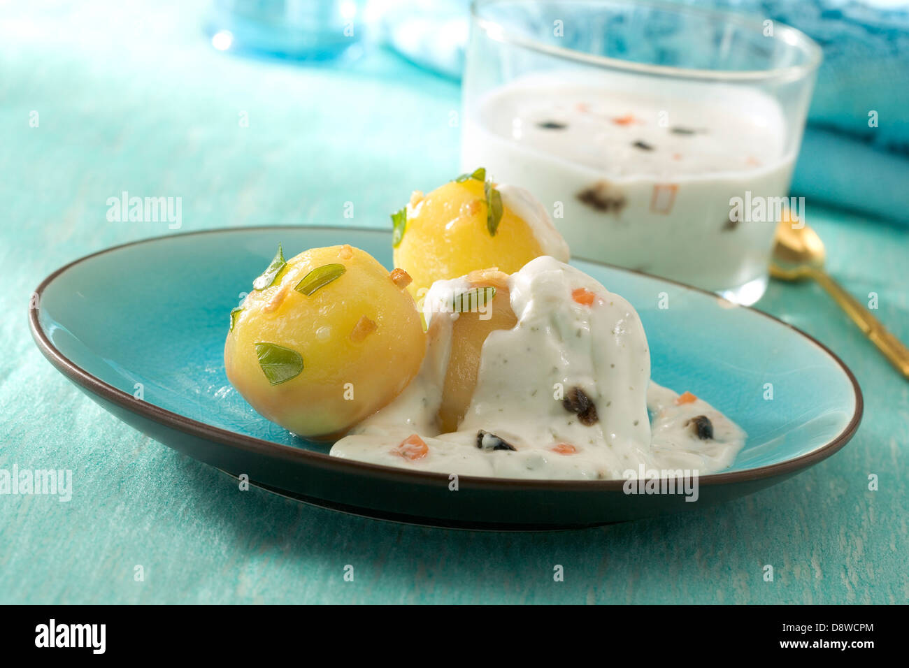 Roast potatoes with Tartare cheese sauce Stock Photo - Alamy