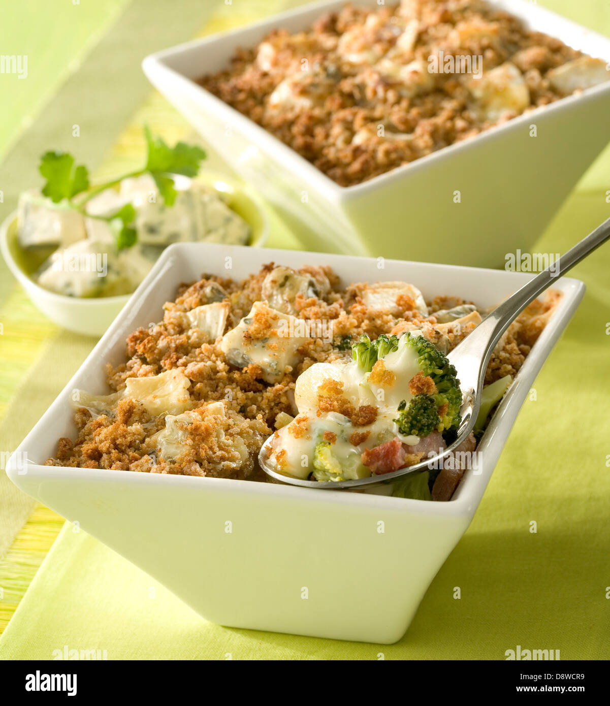 Vegetable and Blue de Bresse savoury crumble Stock Photo - Alamy
