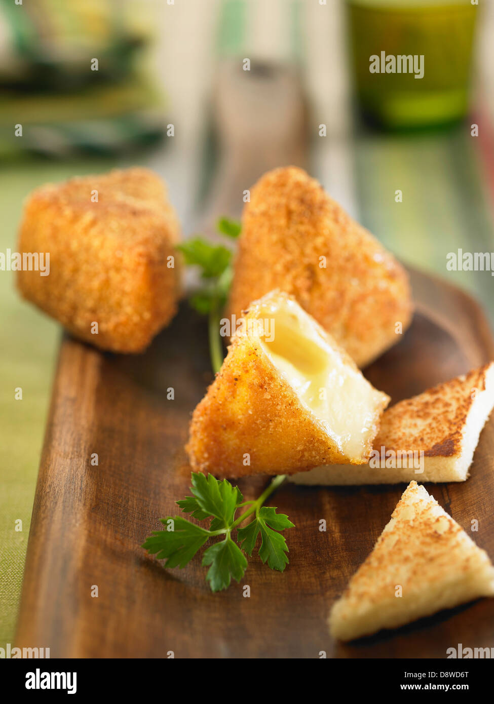 Breaded Camembert croquettes Stock Photo - Alamy