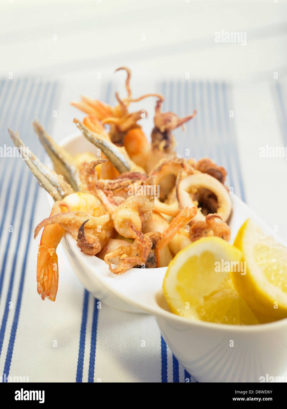 Deep-fried calamaries,anchovies and gambas Stock Photo - Alamy