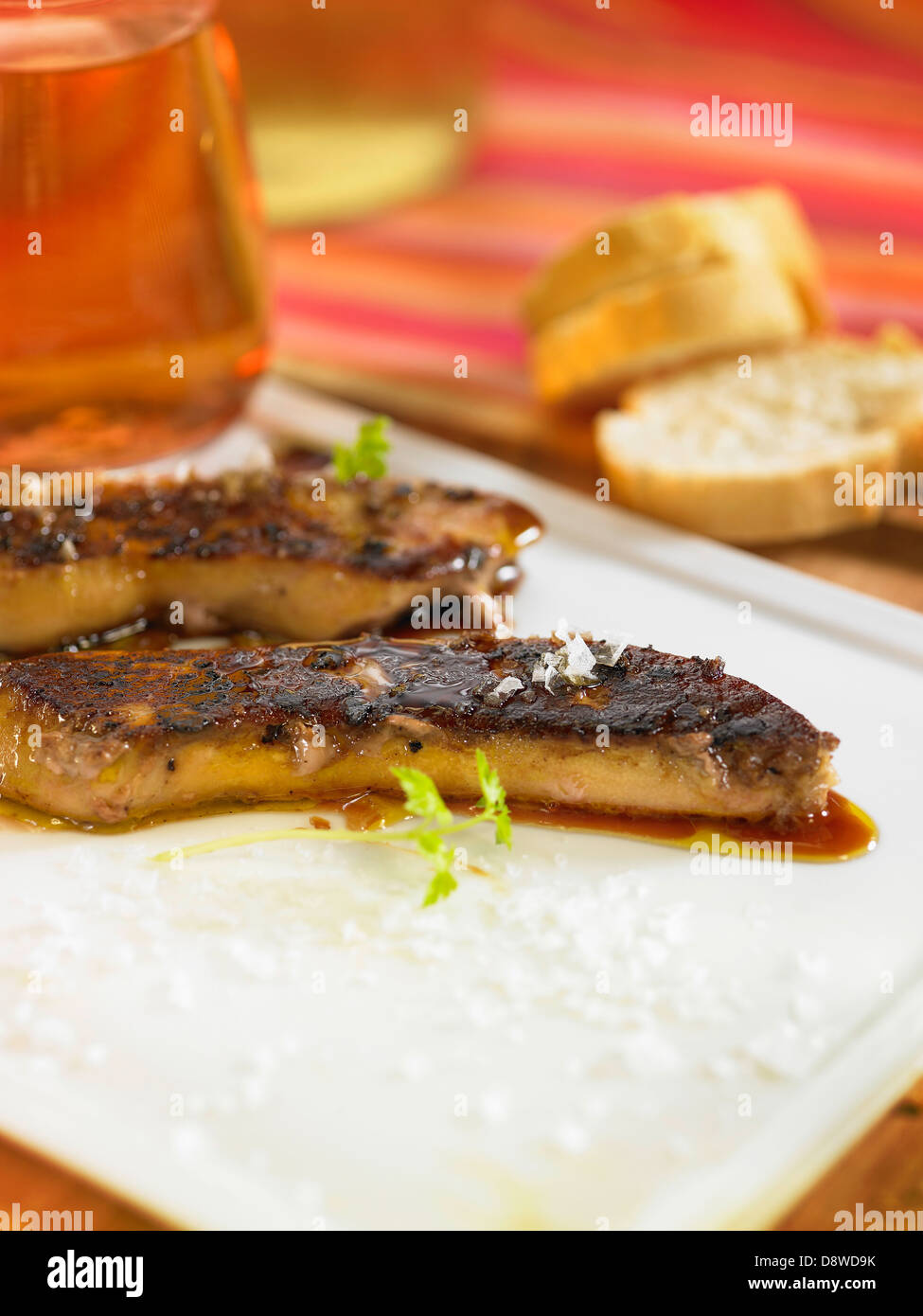 Pan-fried foie gras with Xeres and parsley Stock Photo - Alamy