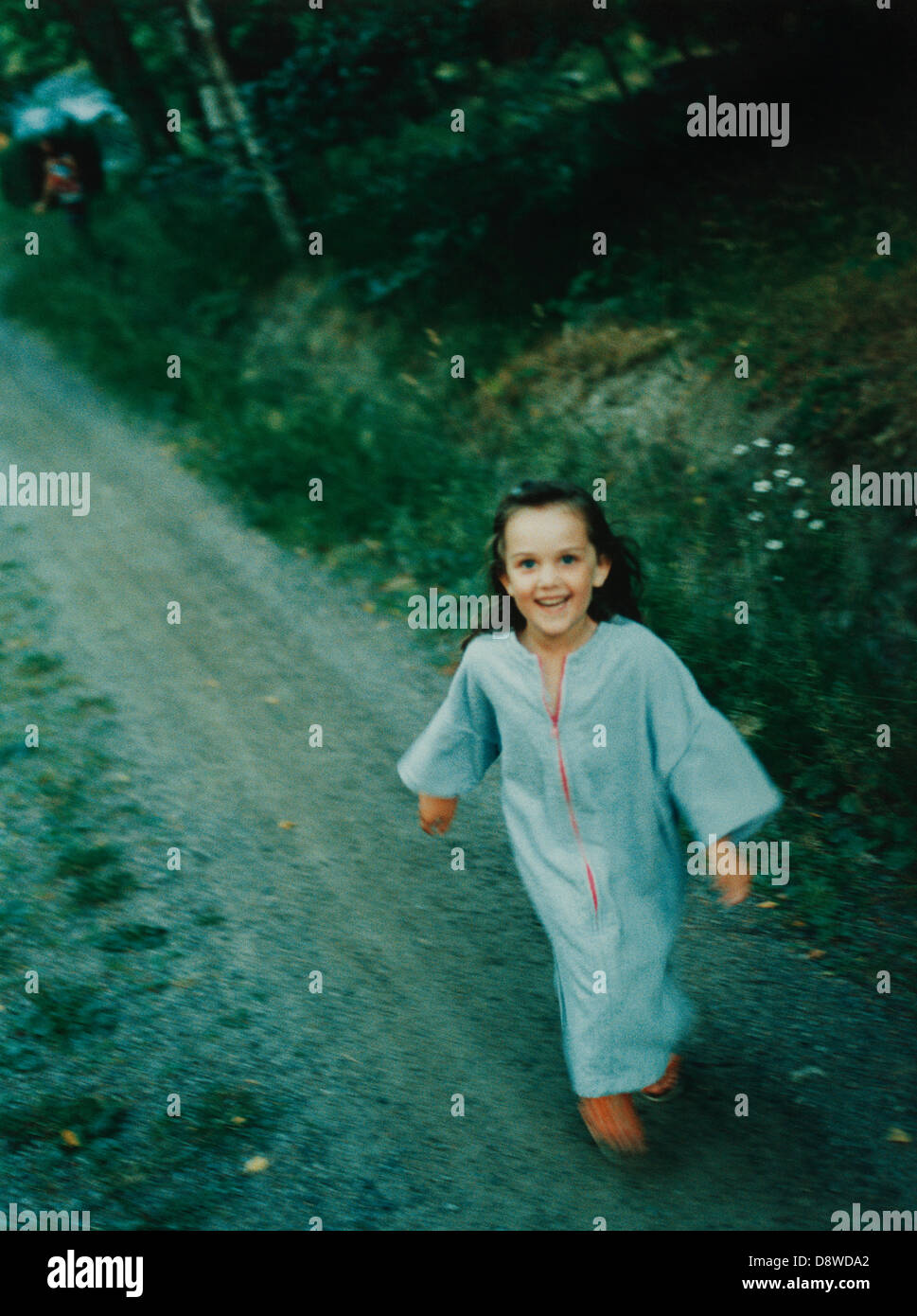 Girl running on country road hi-res stock photography and images - Alamy