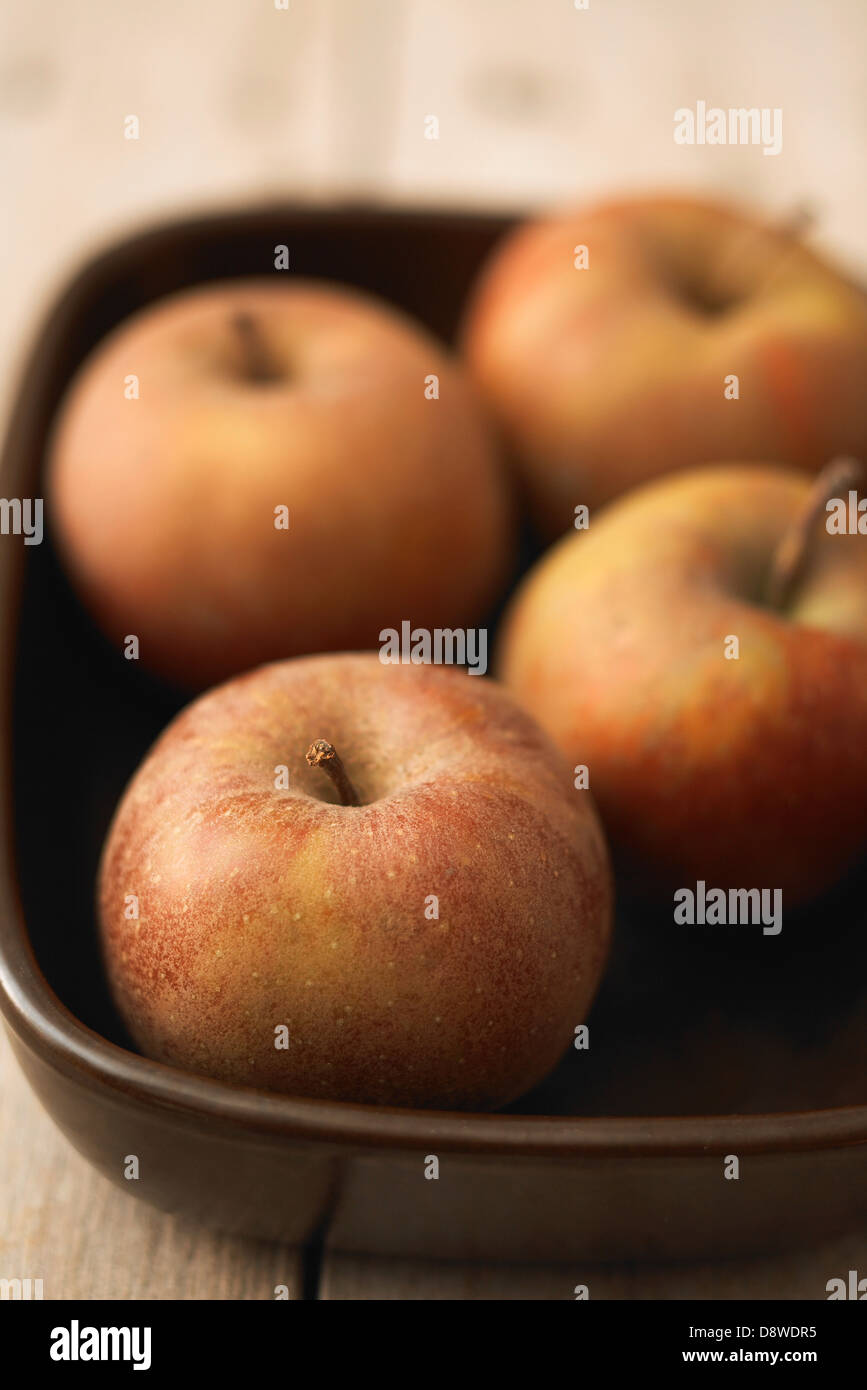 Apples in a dish Stock Photo - Alamy