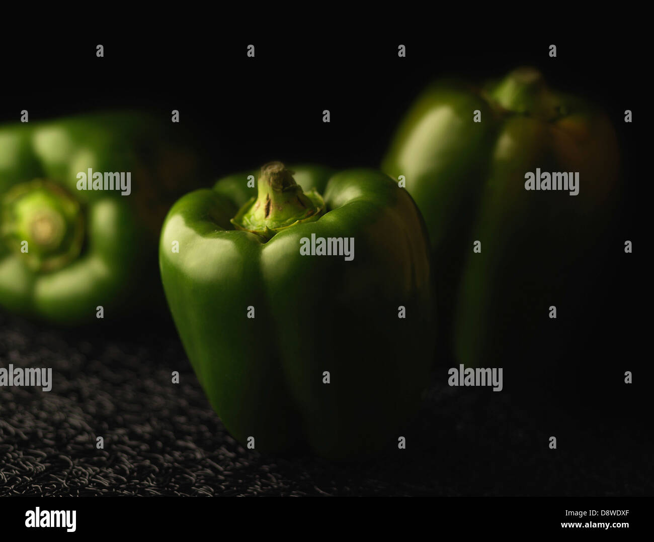 Three green peppers Stock Photo - Alamy
