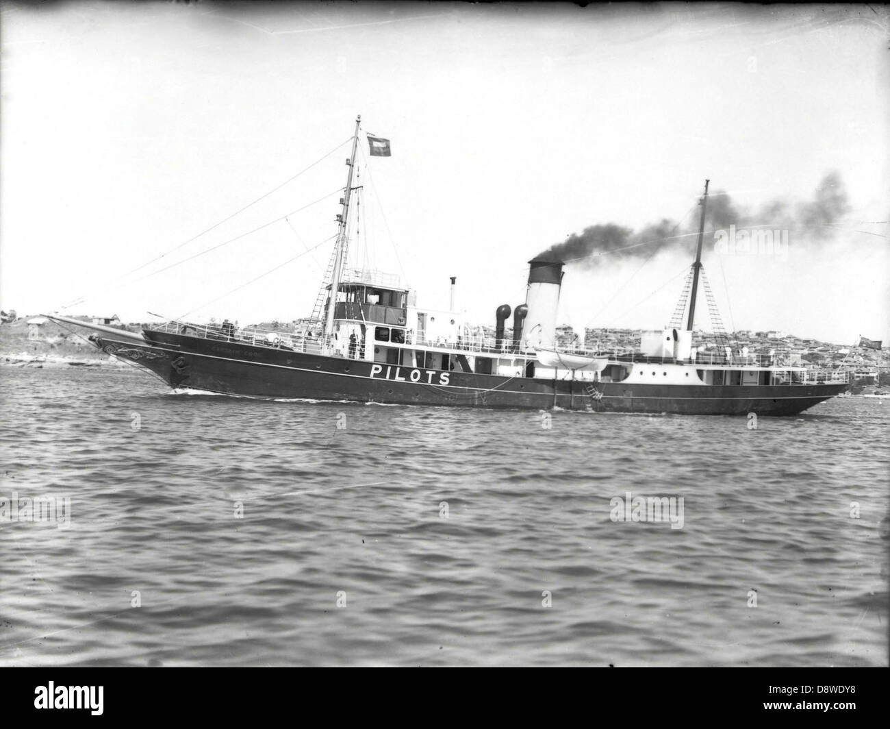This black and white photo shows the 'Captain Cook' vessel on Sydney ...