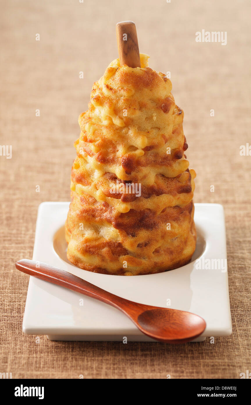 Individual traditional cake cooked on the spit Stock Photo - Alamy