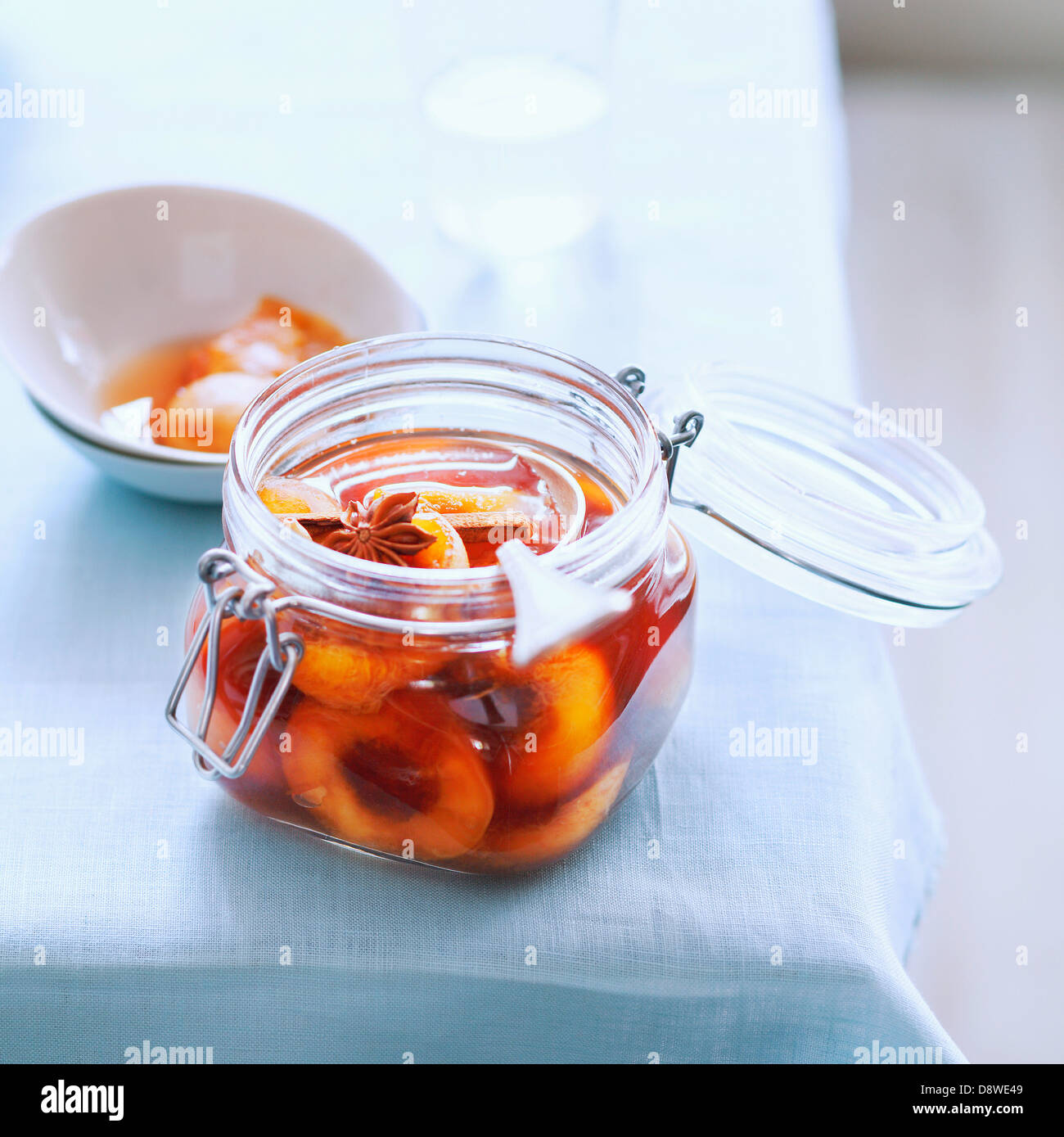 Jar of spicy stewed peaches Stock Photo - Alamy