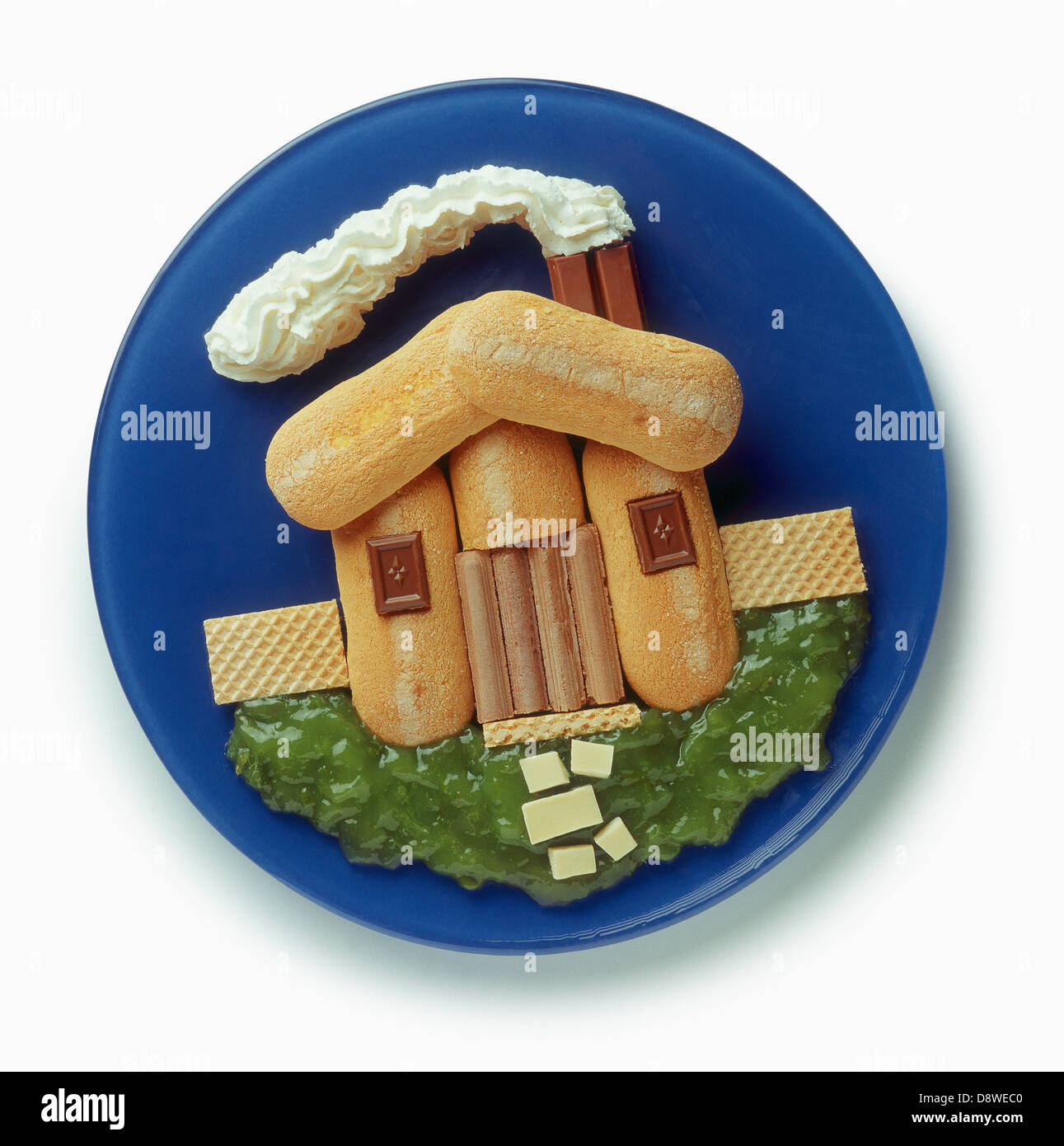 Picture of a house made with biscuits on a plate Stock Photo - Alamy