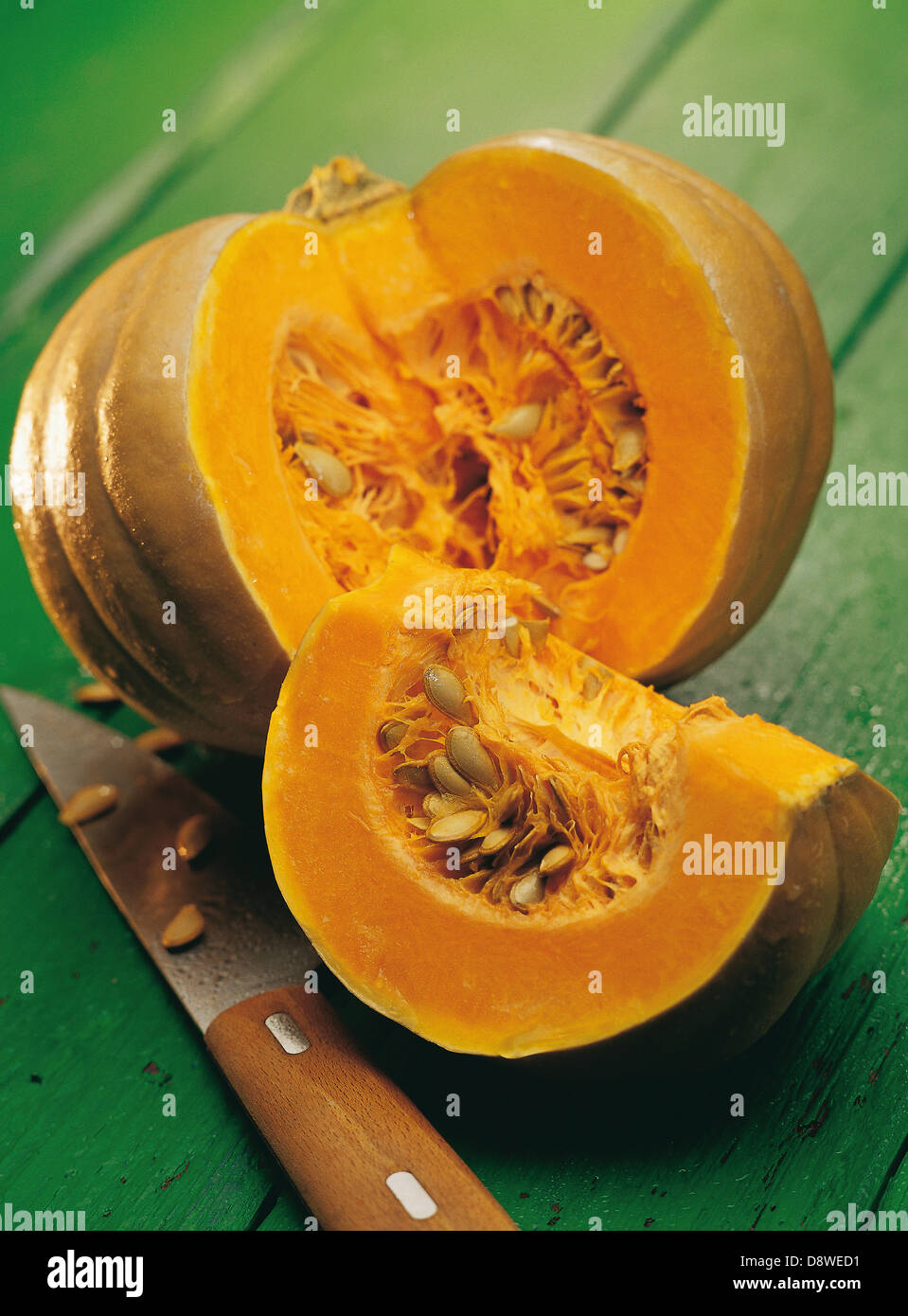Cutting a pumpkin Stock Photo - Alamy