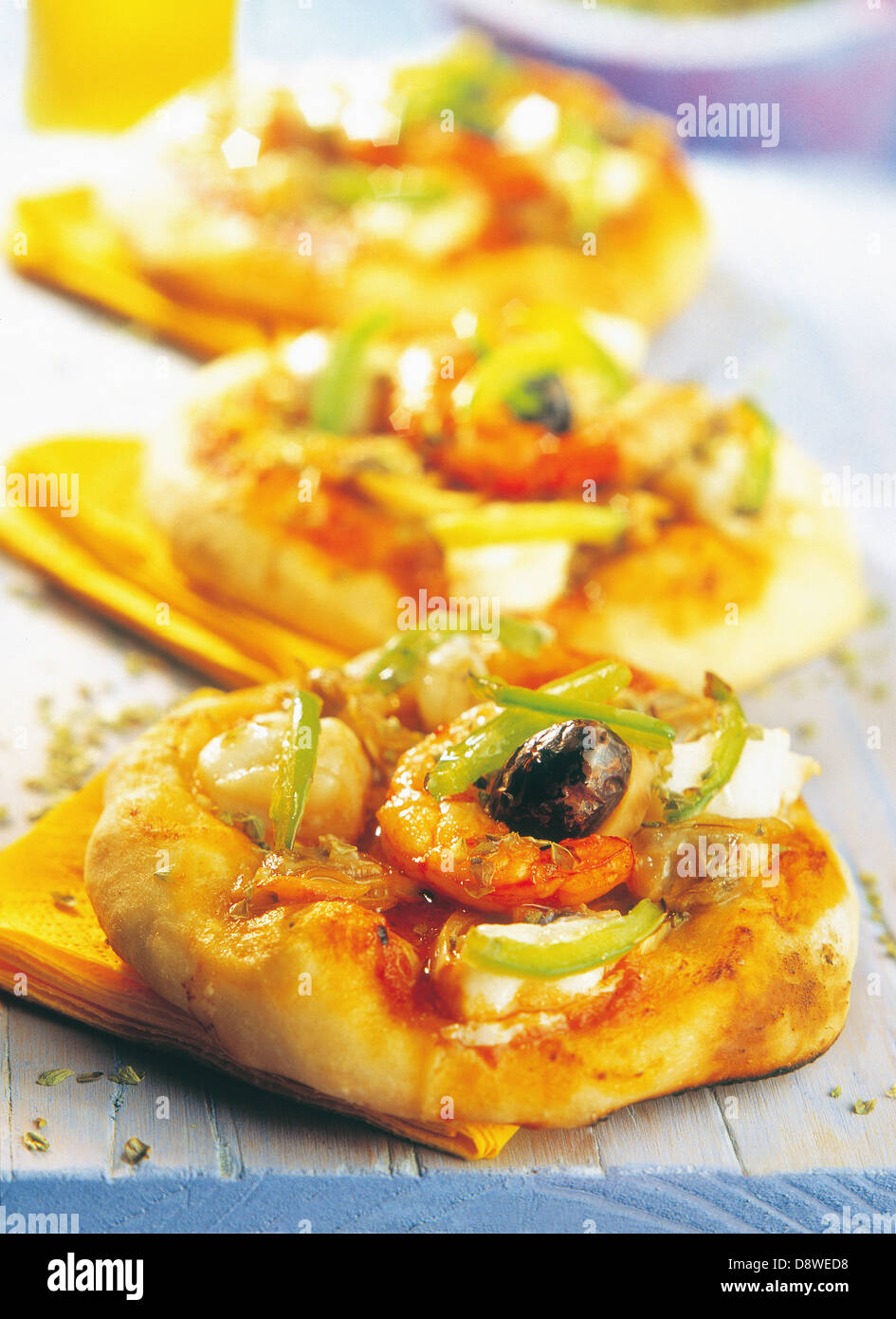 Seafood mini pizzas Stock Photo - Alamy