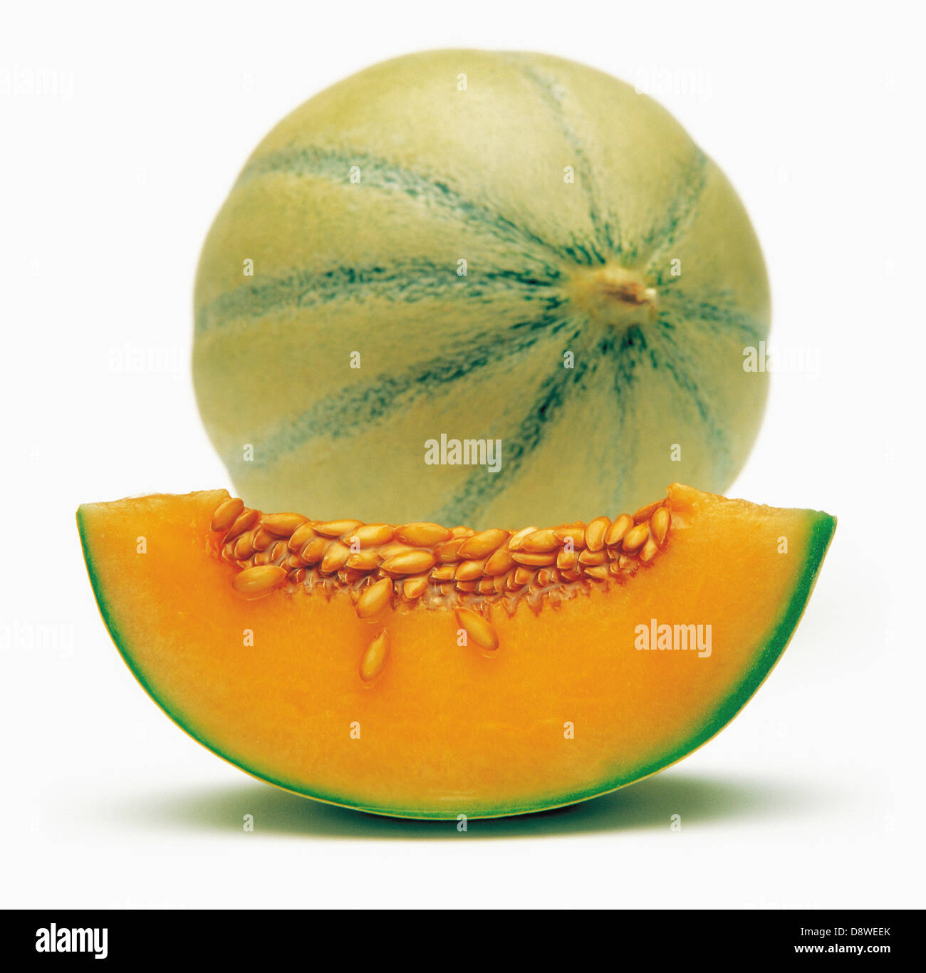Whole melon and a slice of melon Stock Photo - Alamy