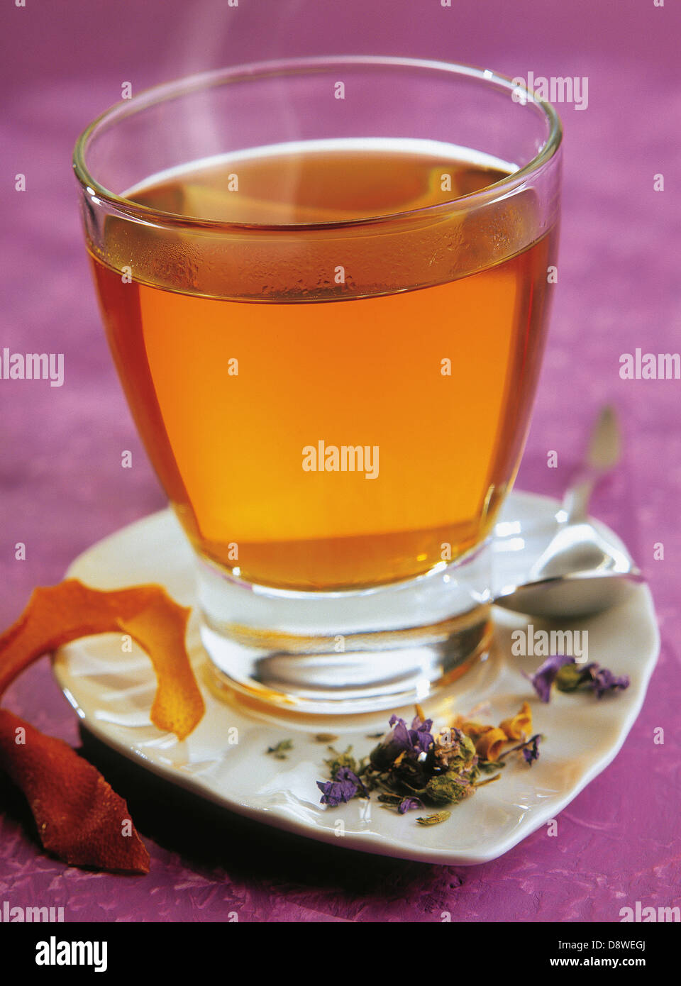 Orange and flower infusion Stock Photo - Alamy