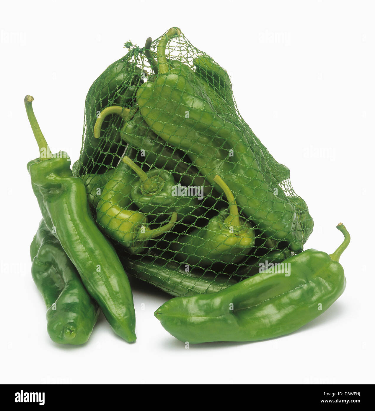 String bag of long green peppers Stock Photo - Alamy