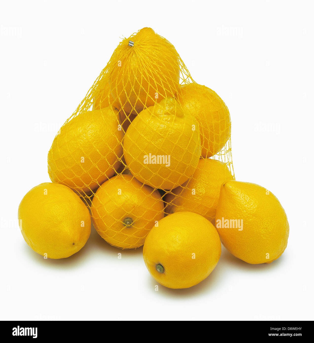 String bag of lemons Stock Photo - Alamy