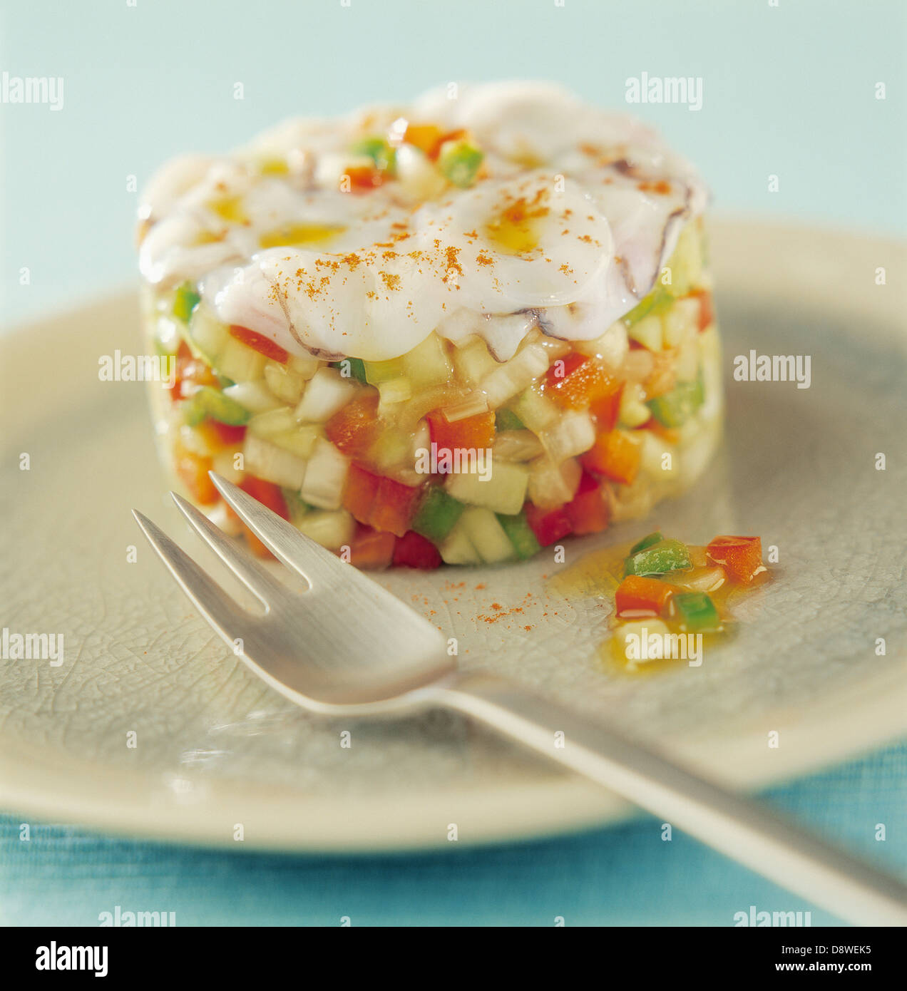 Vegetable and thinly sliced octopus Timbale Stock Photo - Alamy