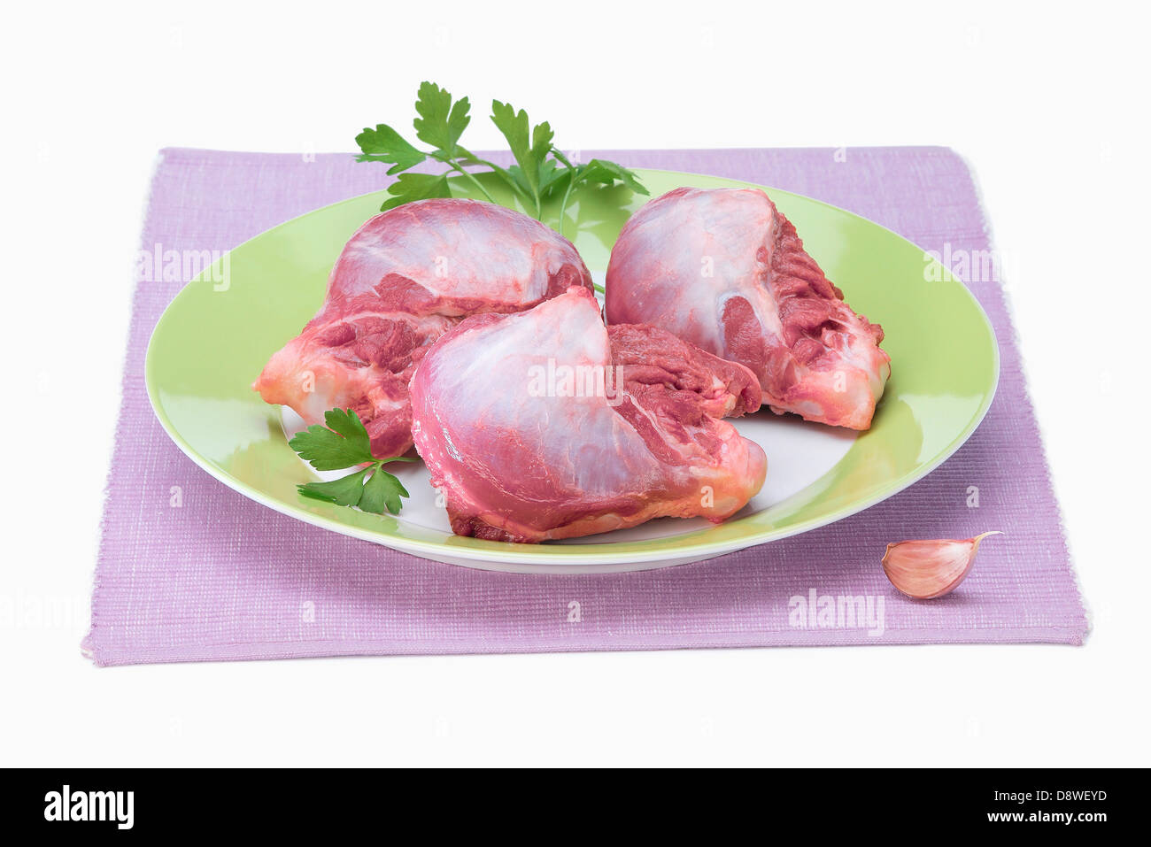 Raw pork cheeks Stock Photo - Alamy
