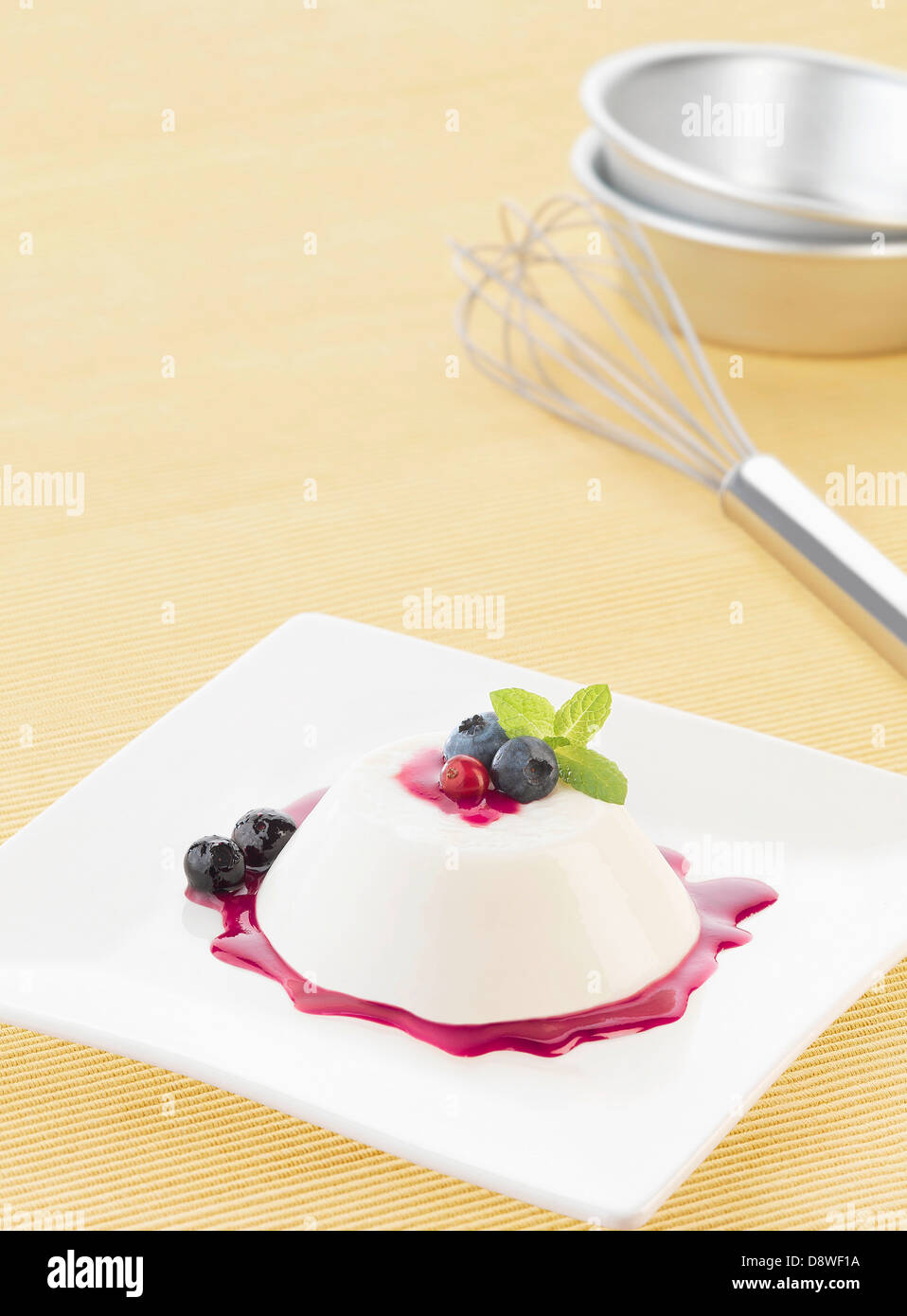 Panna cotta with pureed summer fruit Stock Photo - Alamy