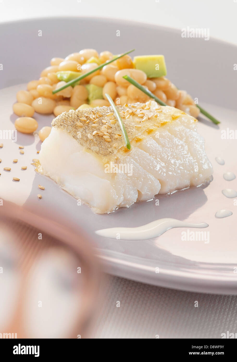 Steamed cod with sesame seeds and coconut milk,white beans with diced ...