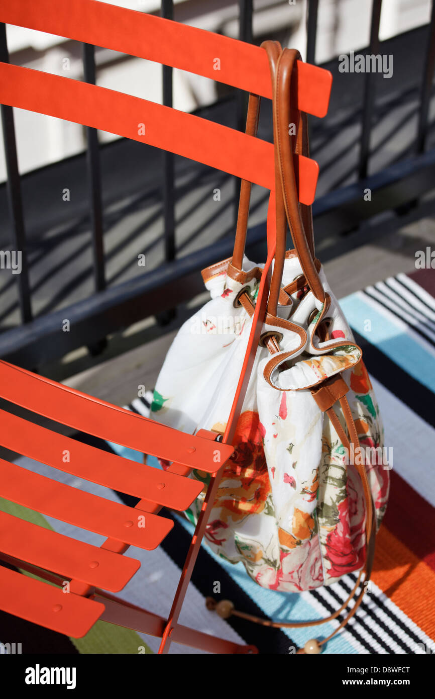 Shoulderbag on chair Stock Photo - Alamy