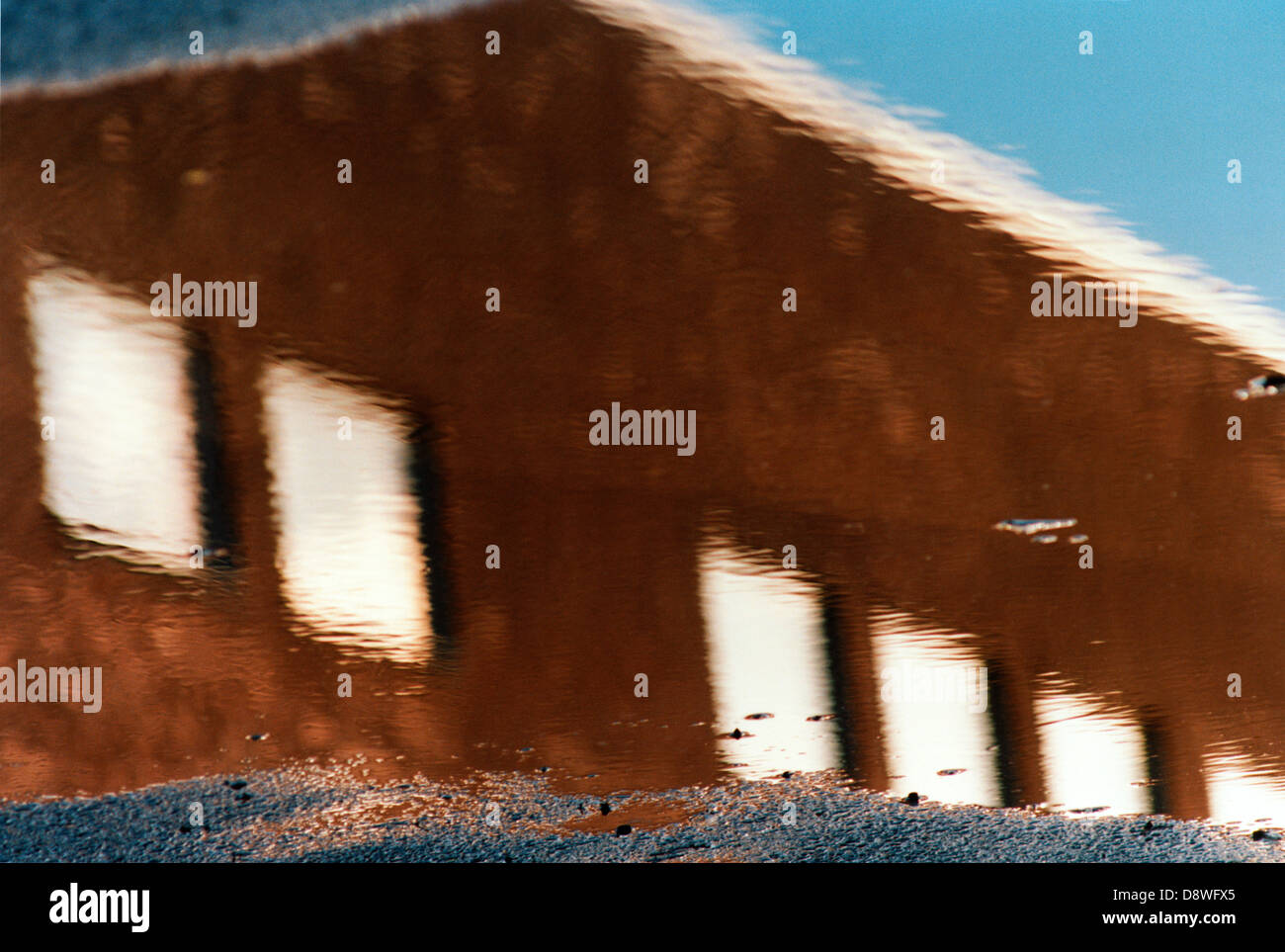 A House Reflected in a Puddle Stock Photo - Alamy