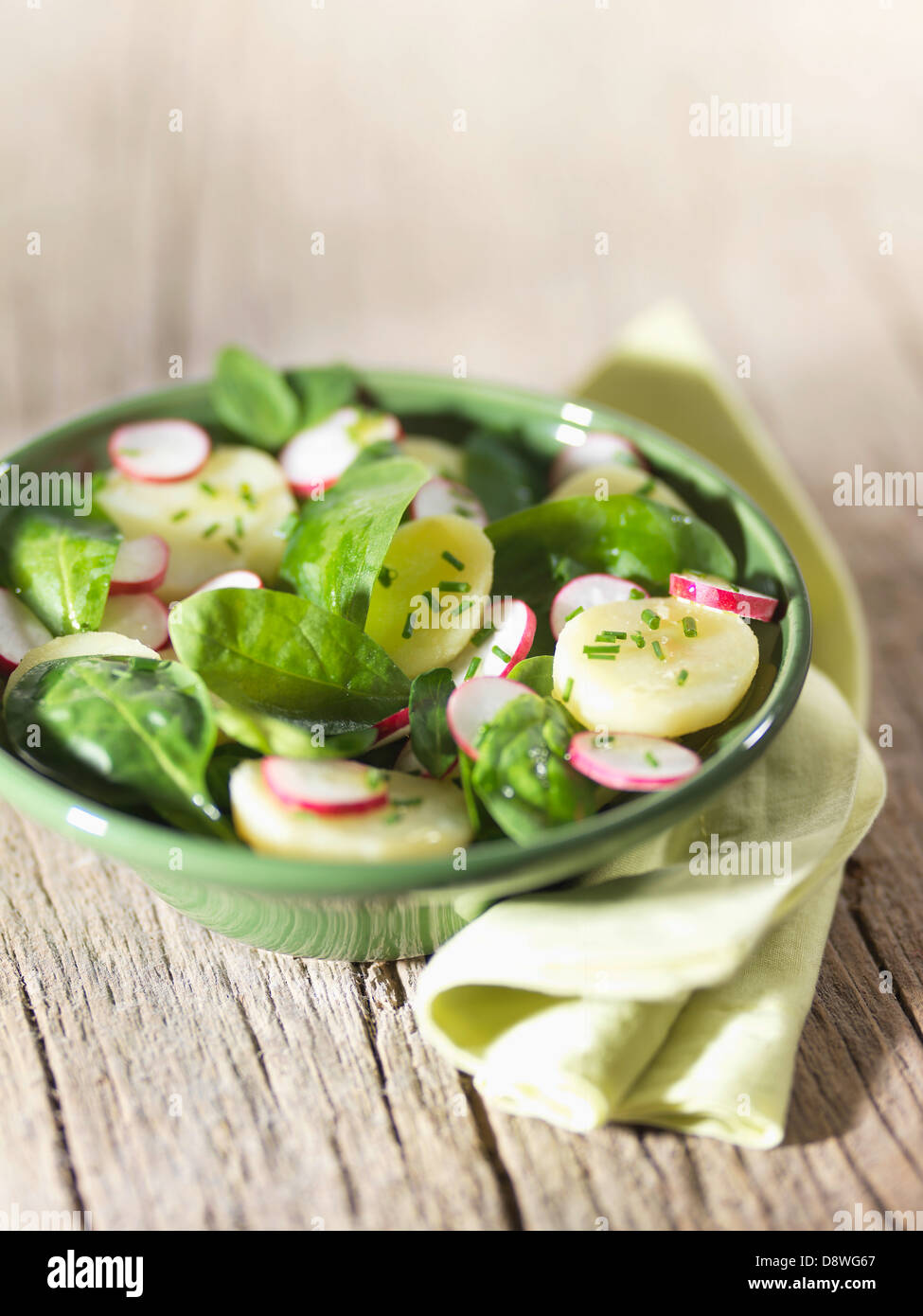 Potato spinach and radish salad Stock Photo - Alamy