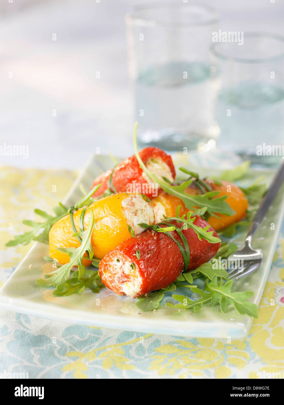 Pepper rolls stuffed with feta Stock Photo - Alamy