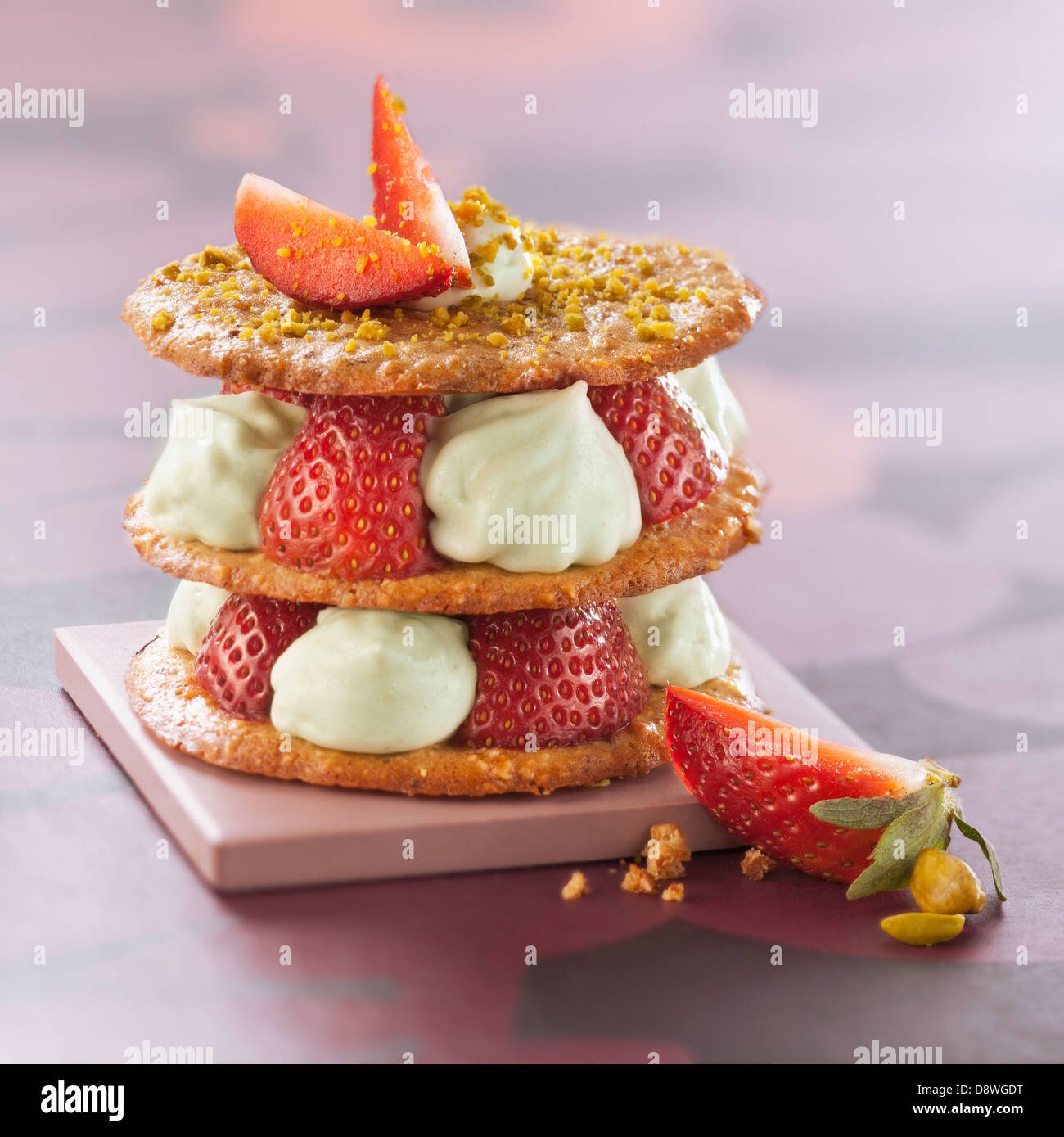 Crunchy pastry,strawberry and pistachio whipped cream dessert Stock ...