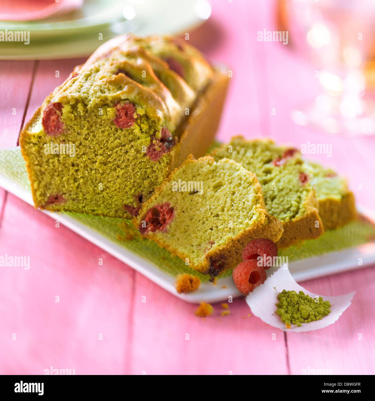 Matcha green tea and raspberry cake Stock Photo - Alamy