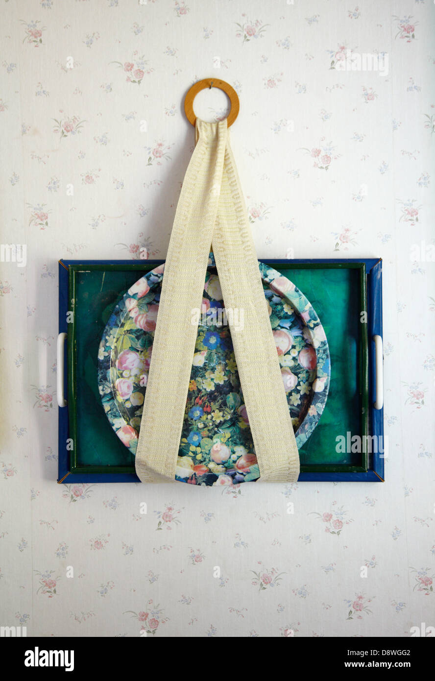 Trays hanging on wall Stock Photo - Alamy